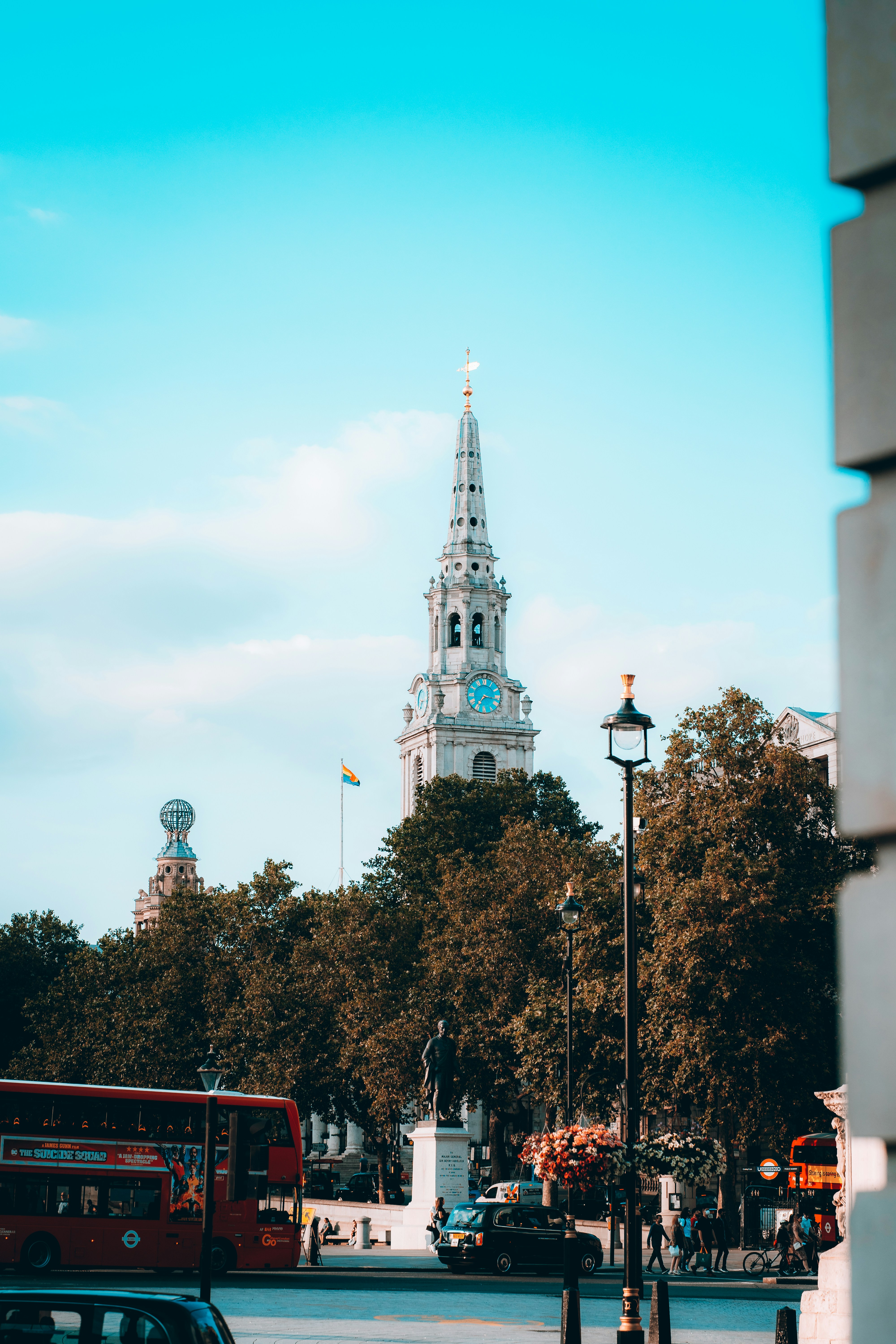 Timekeeper's Peak: Clock Tower Framing a Sunny City Square