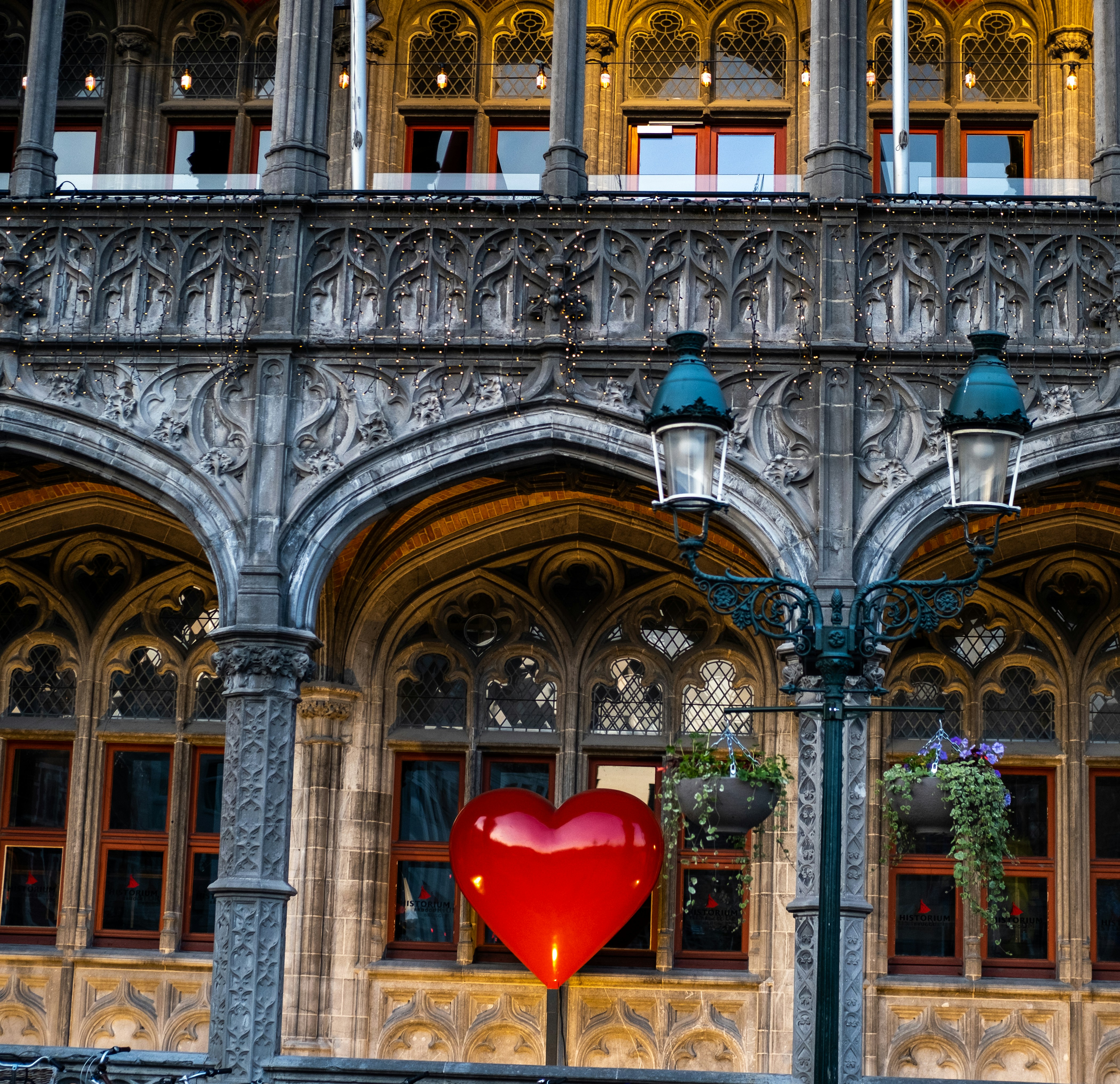 Scarlet Heart Floating Above Gothic Arches