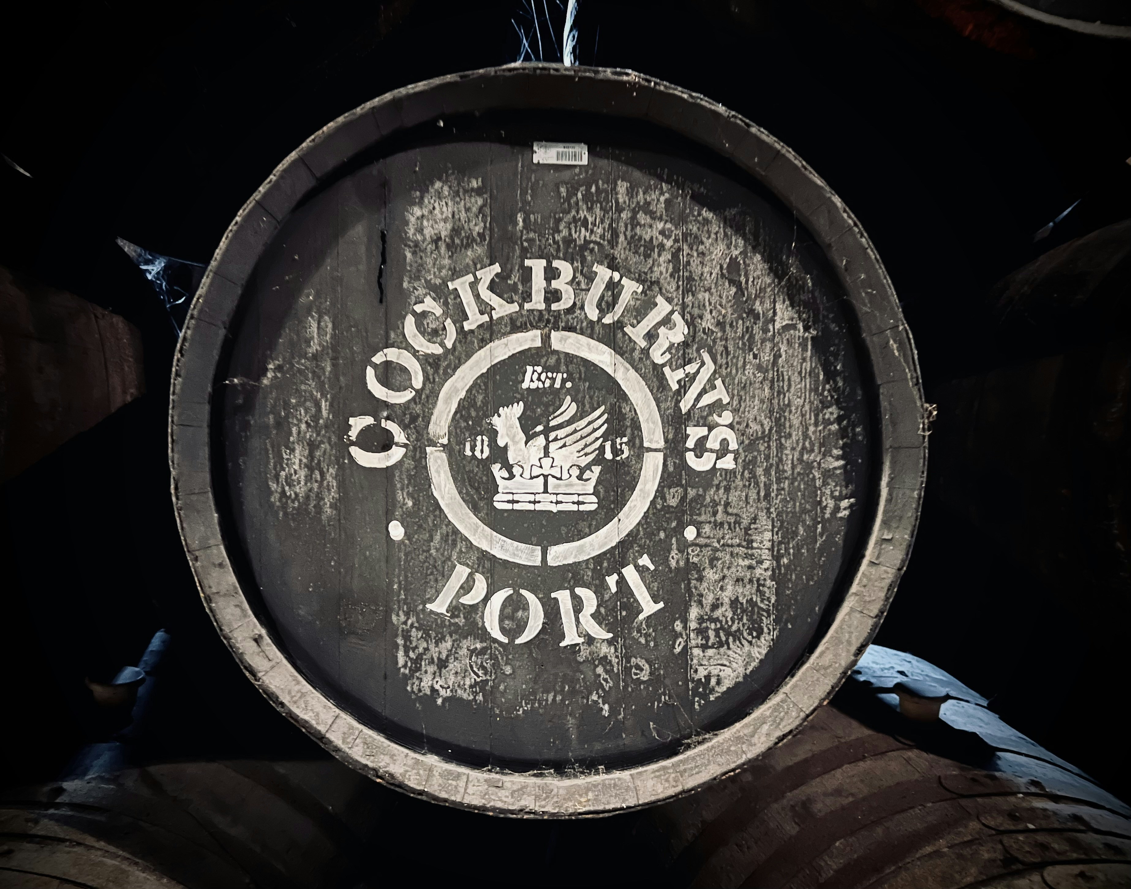 Cockburn’s Port Barrell | a circular object with writing on it