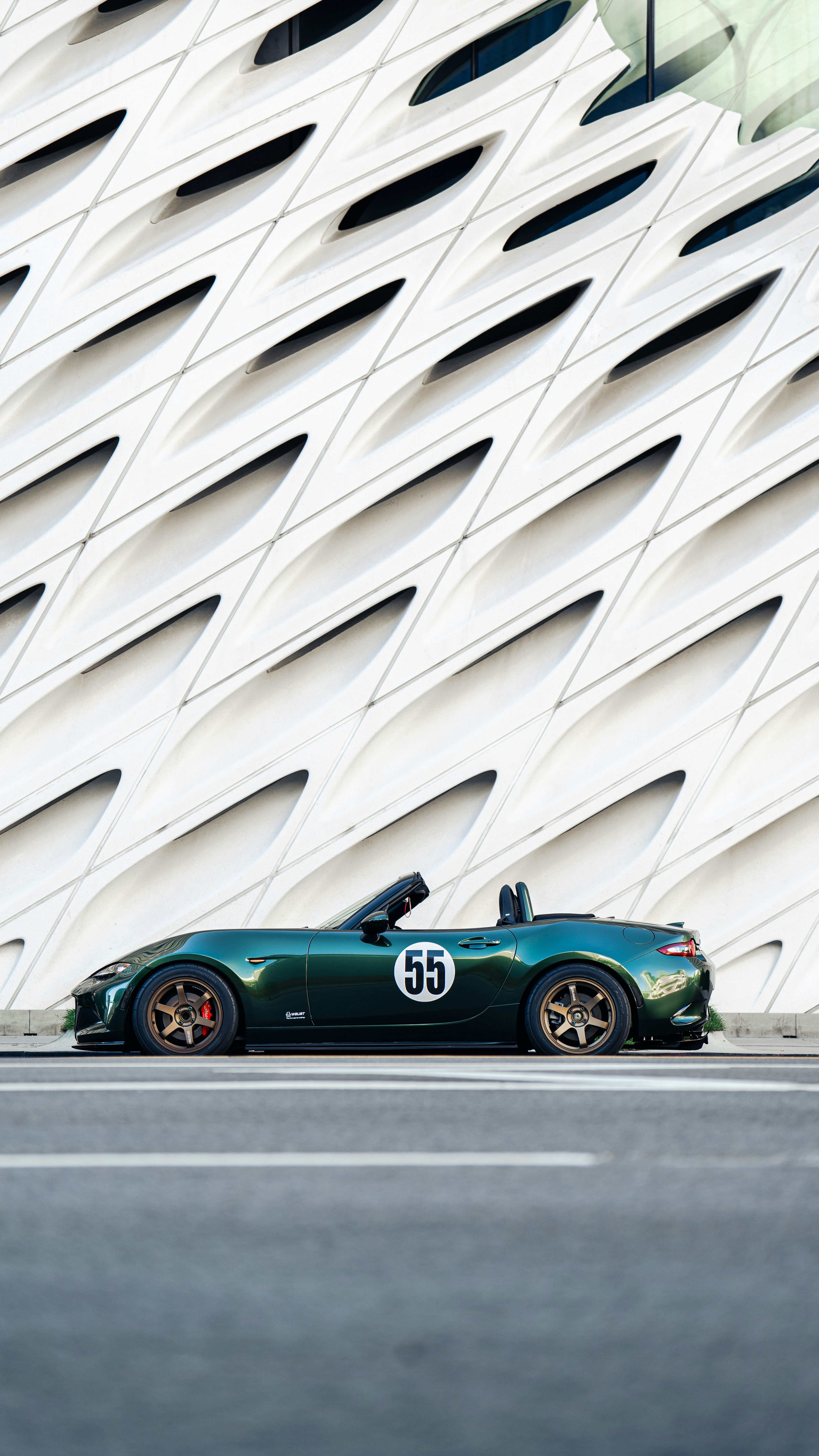 Emerald Roadster Before the Diamond Facade