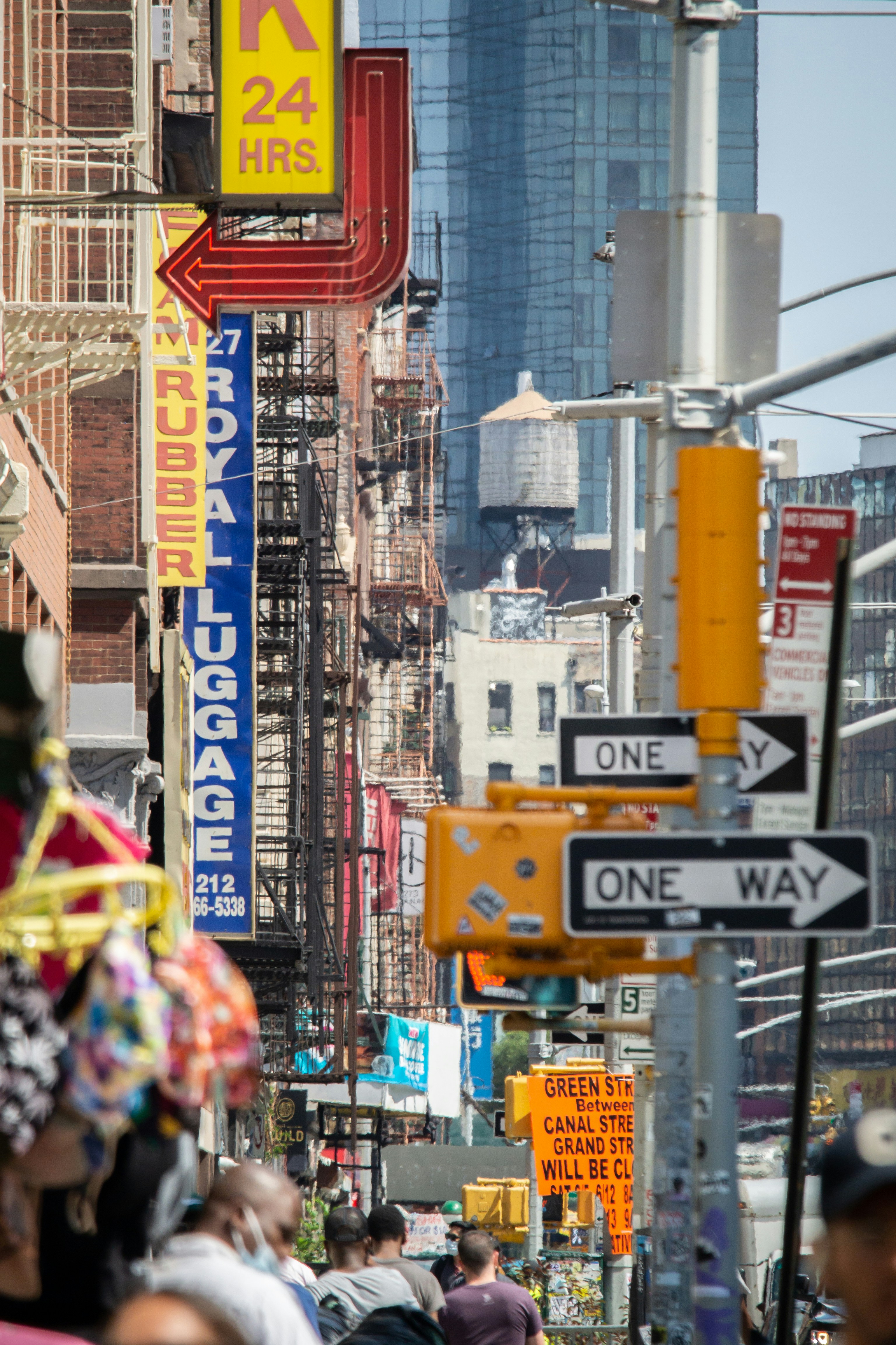 Neon Alley: Signs, Street Curb, and Confident Stride