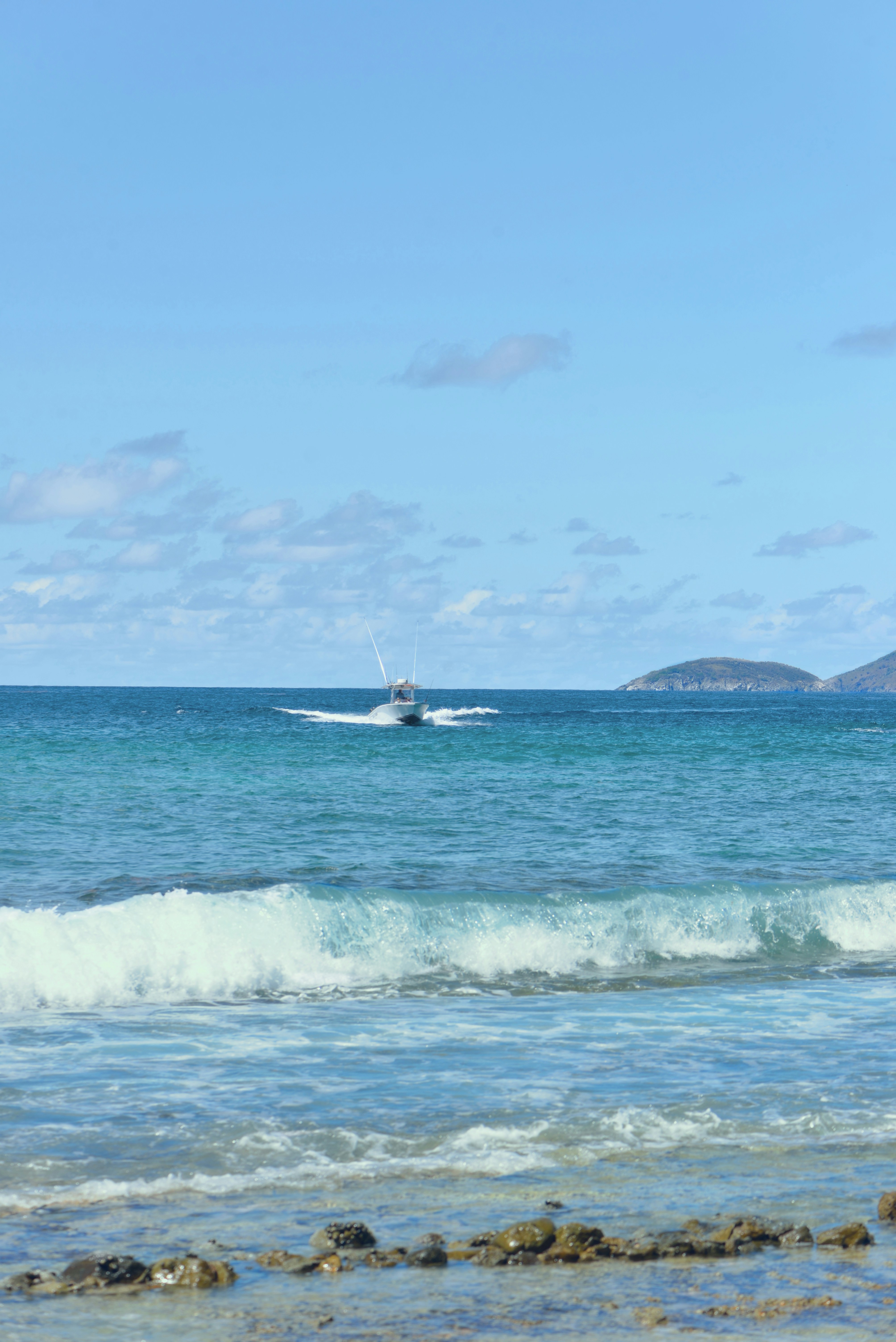 Whisper of a Sailboat Across a Turquoise Horizon