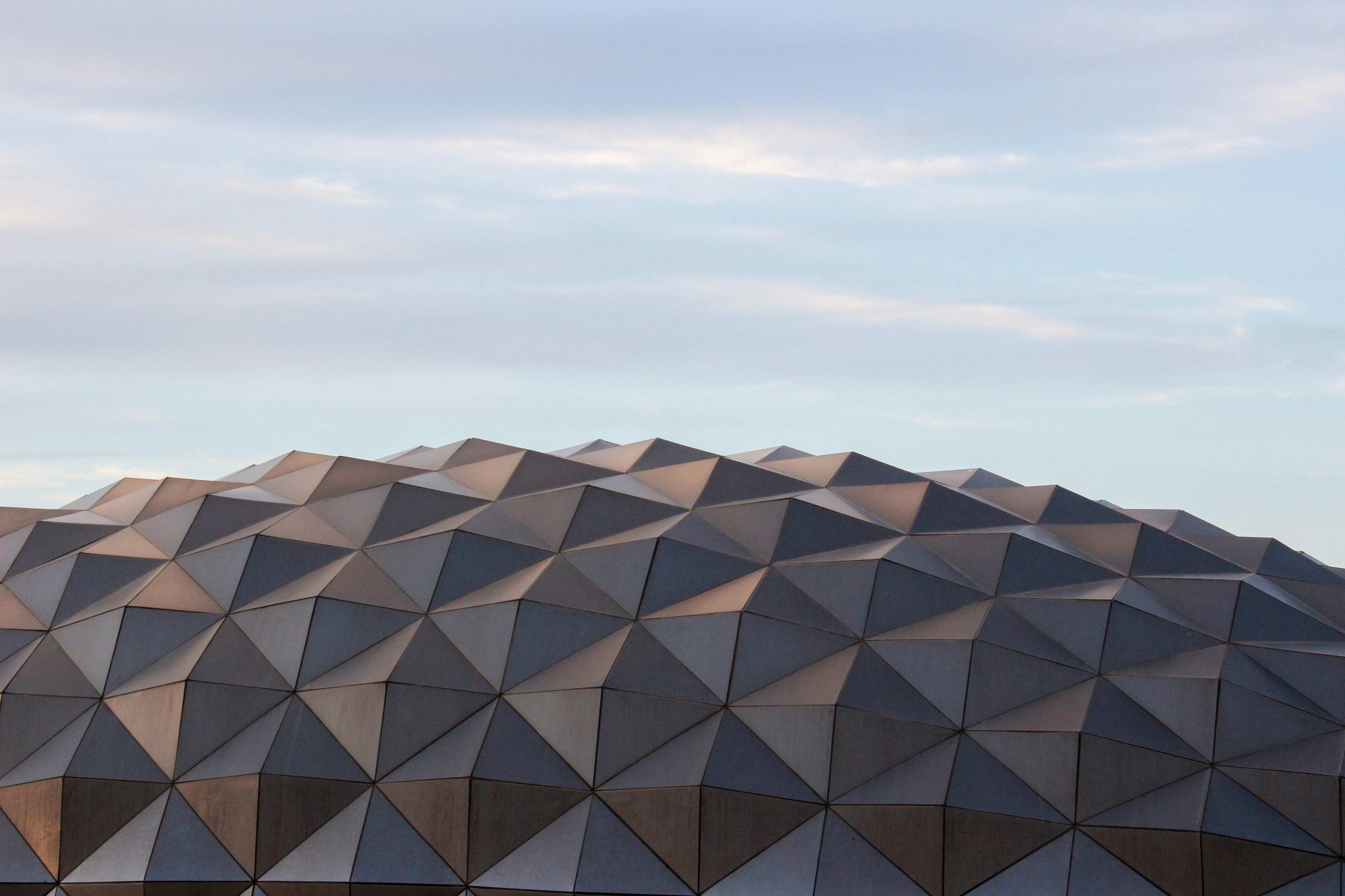 Dusk on a Faceted Dome: A Geometric Quilt of Light