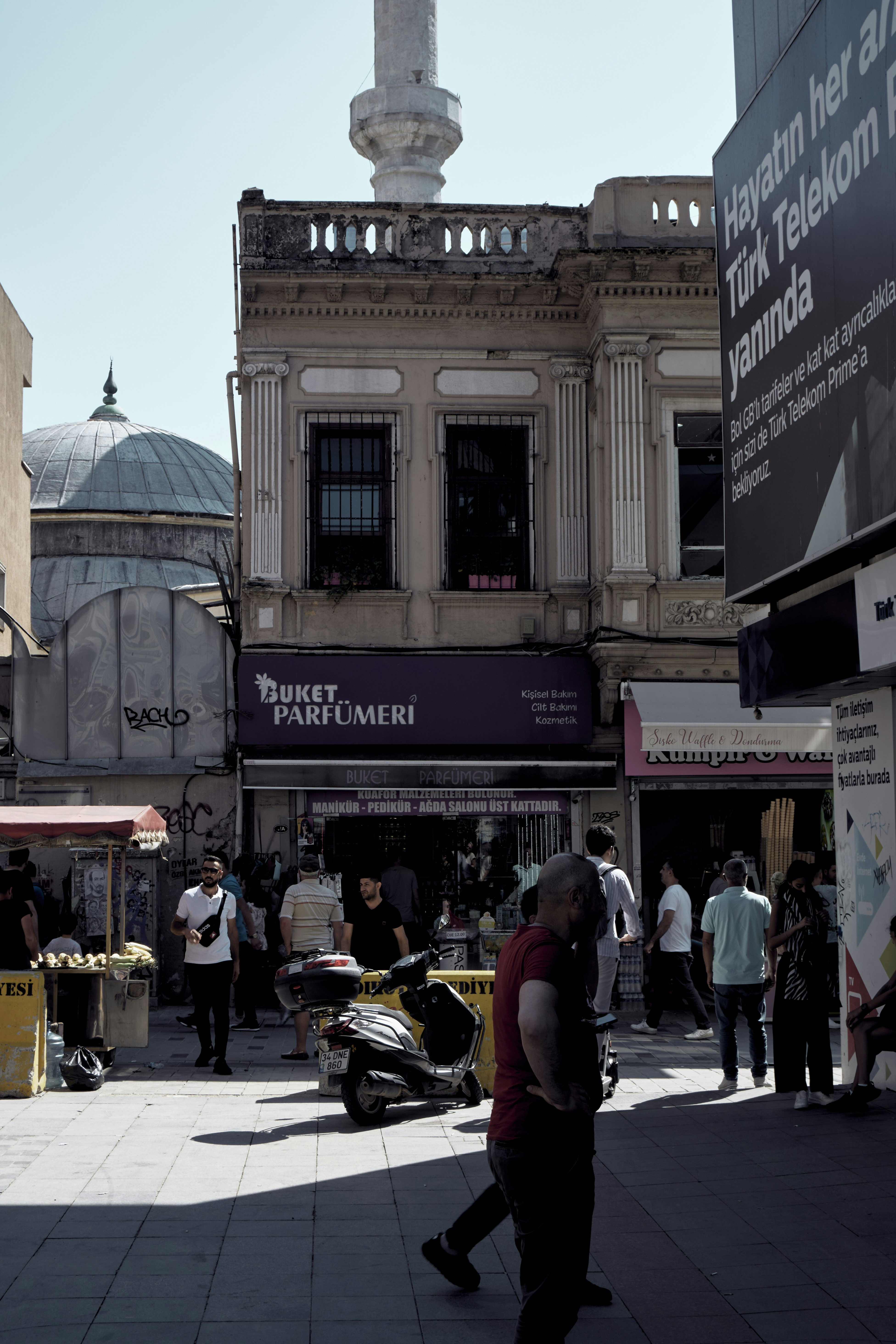 Beneath the Balcony: A City Market in Motion