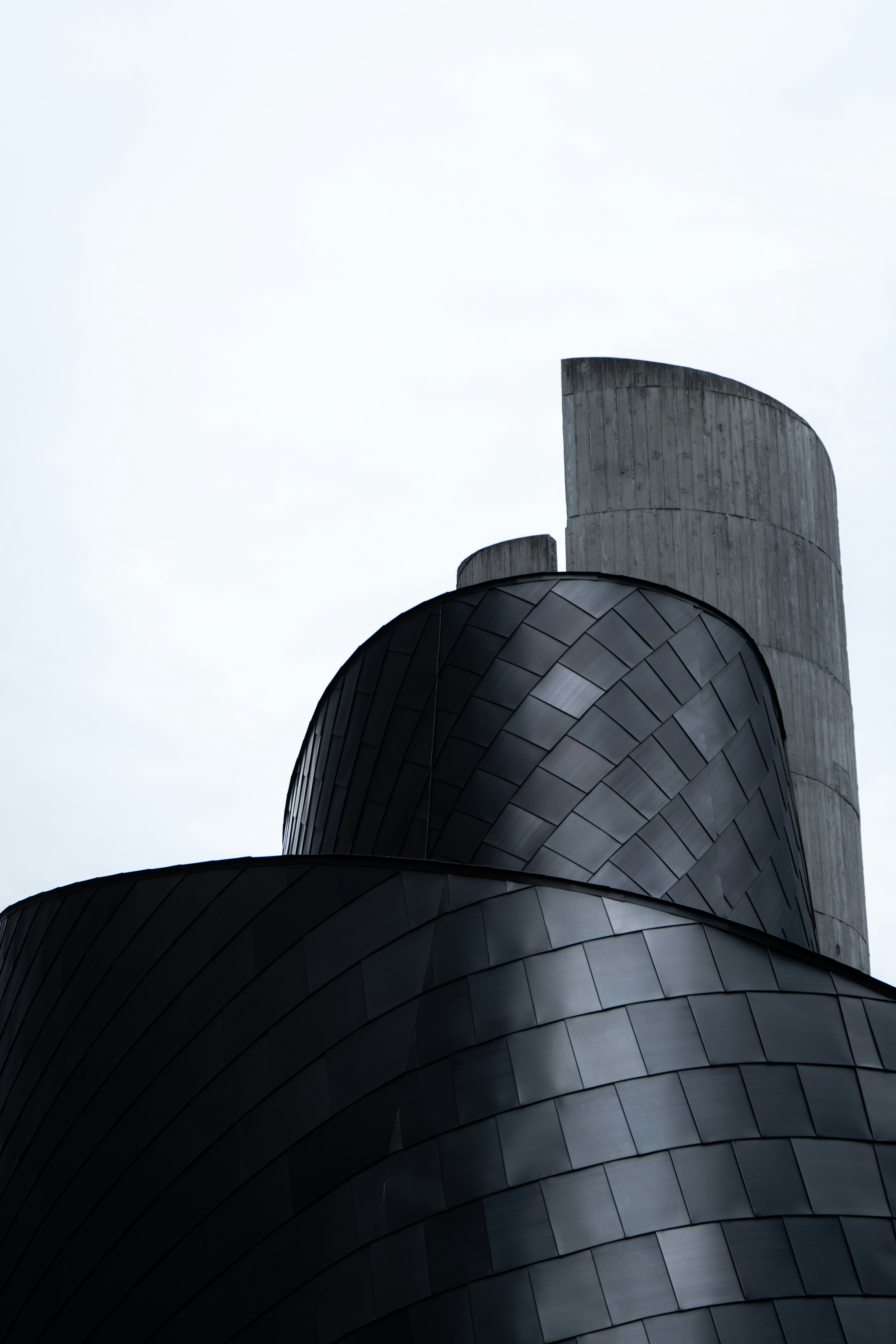 A group of cylindrical structures photo – Free Grey Image on Unsplash