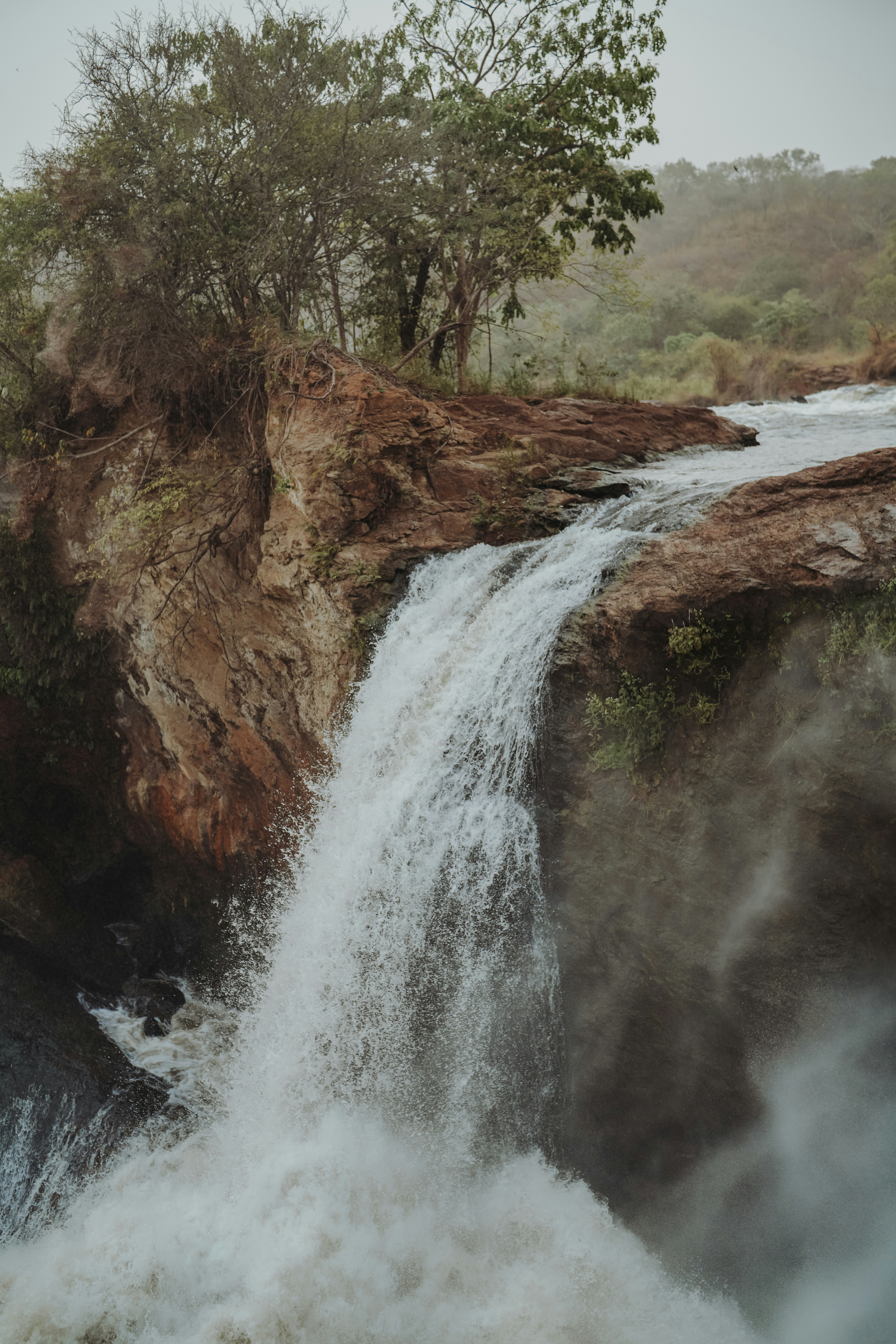 Veil of Spray Along a Cliffside Cascade