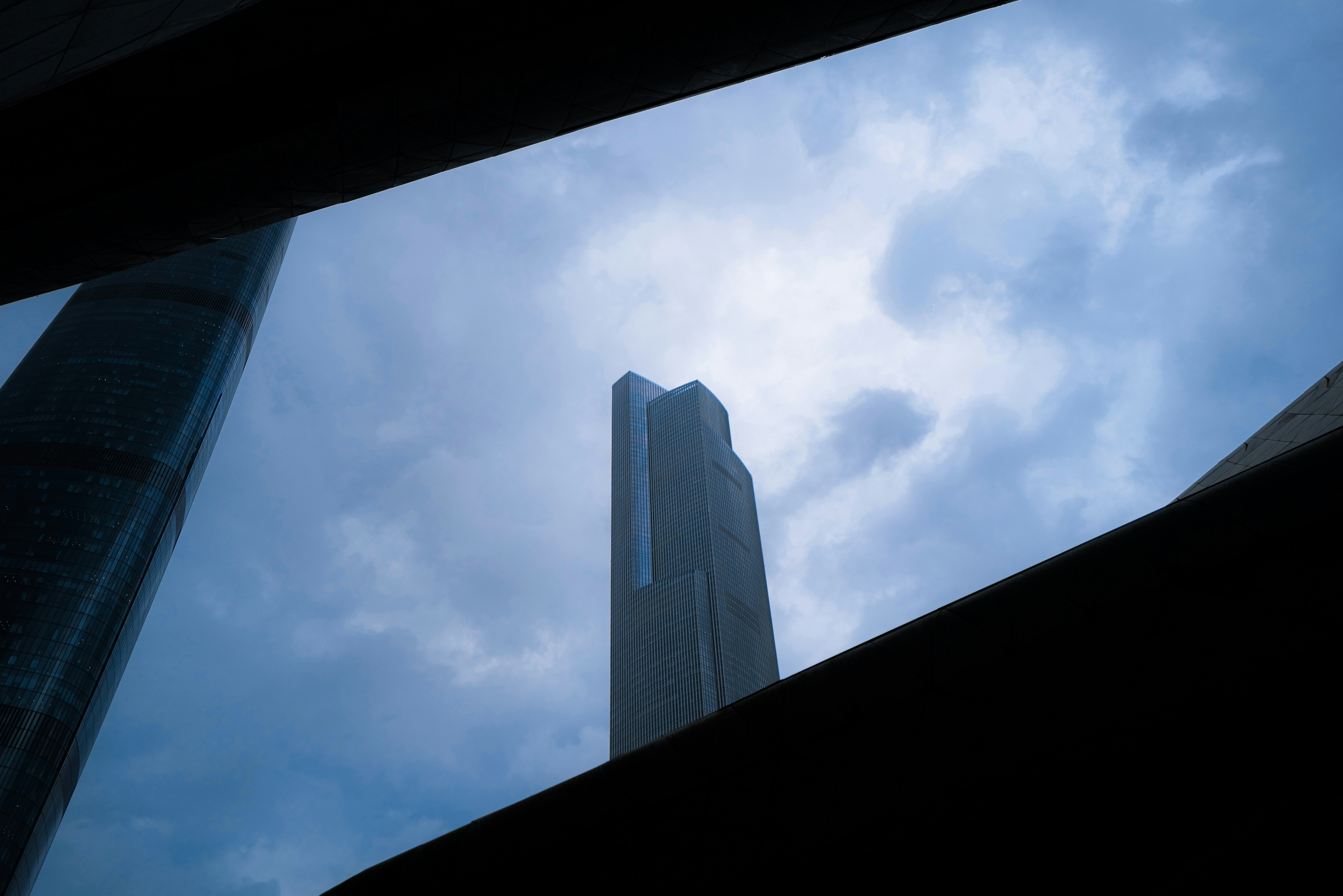 A view looking up at a tall building from the ground photo – Free China ...