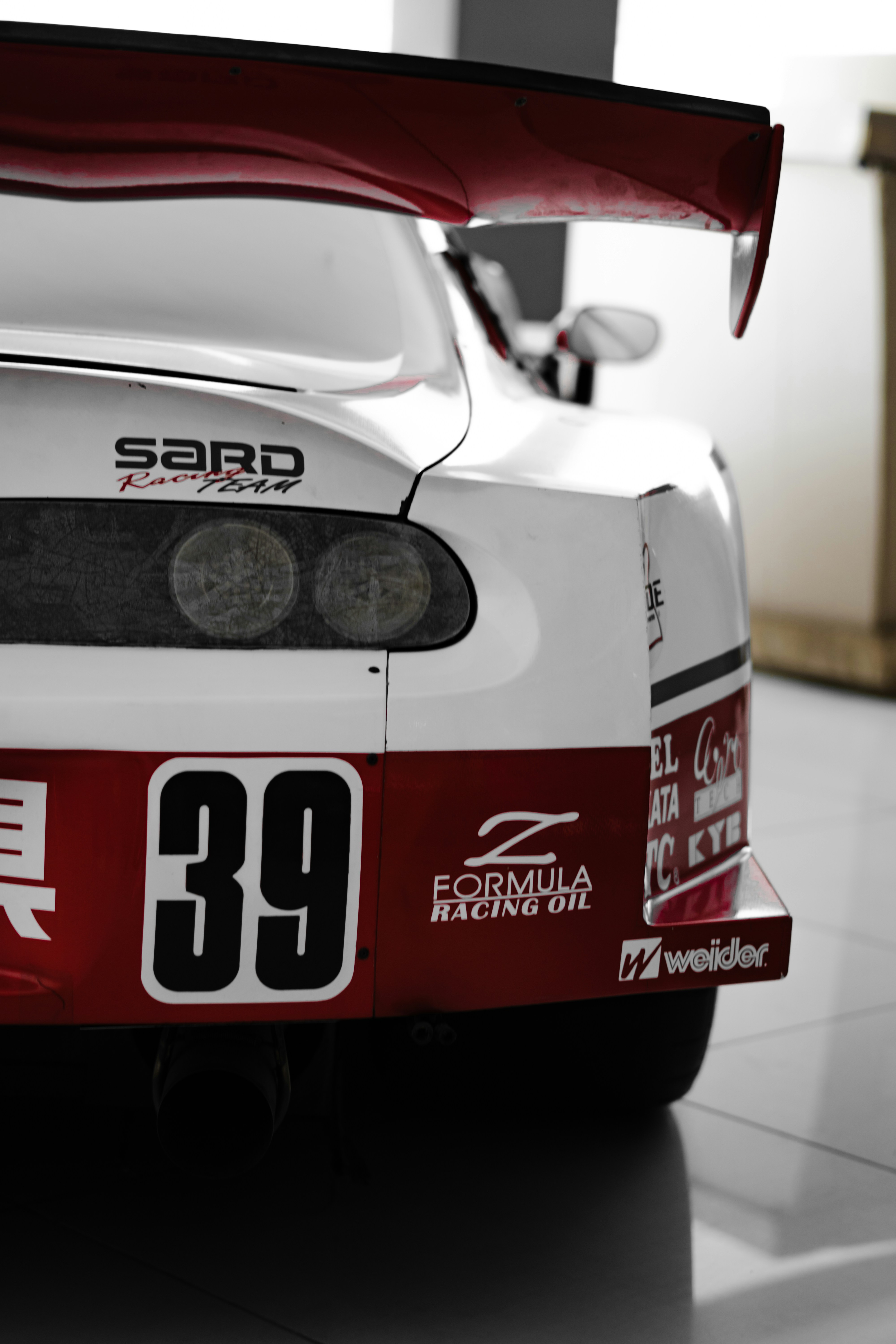 Rear-Wing Portrait: White and Red Racing Car, Number 39