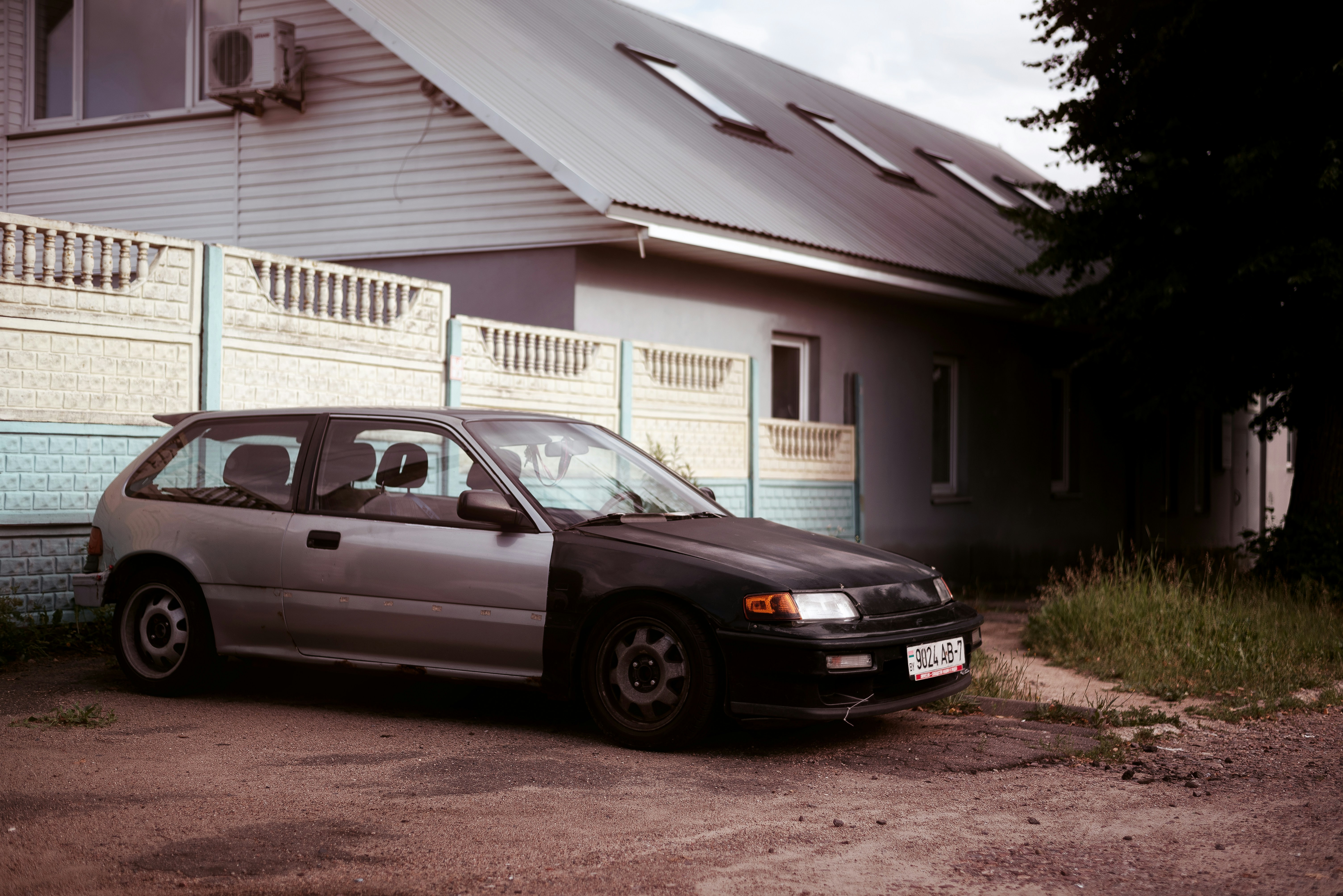 Rustic Charm: Hatchback by the House