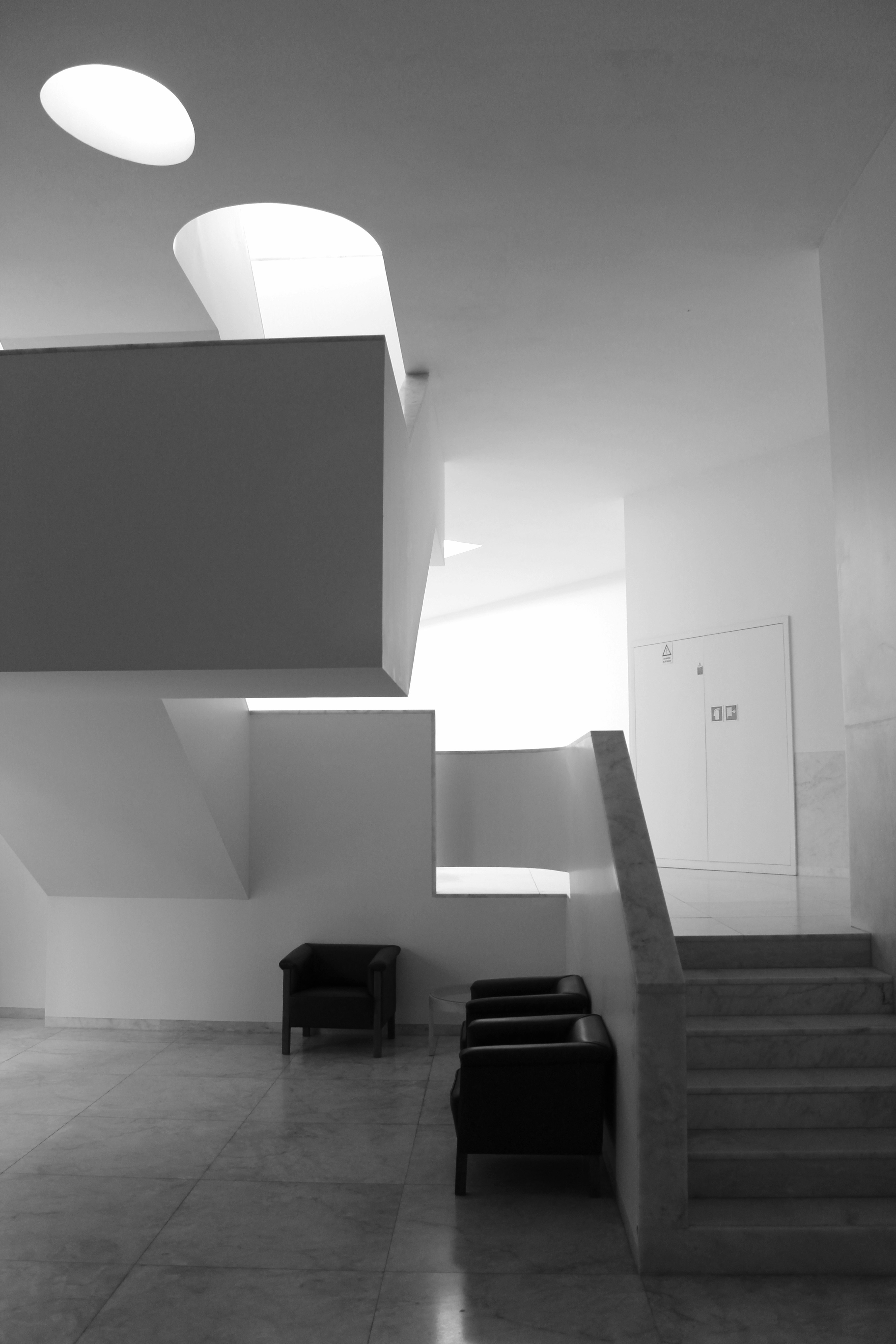 A black and white shot of the incredible staircase of the Siza and Souto de Moura designed Santo Tirso Museum.Rui Alves