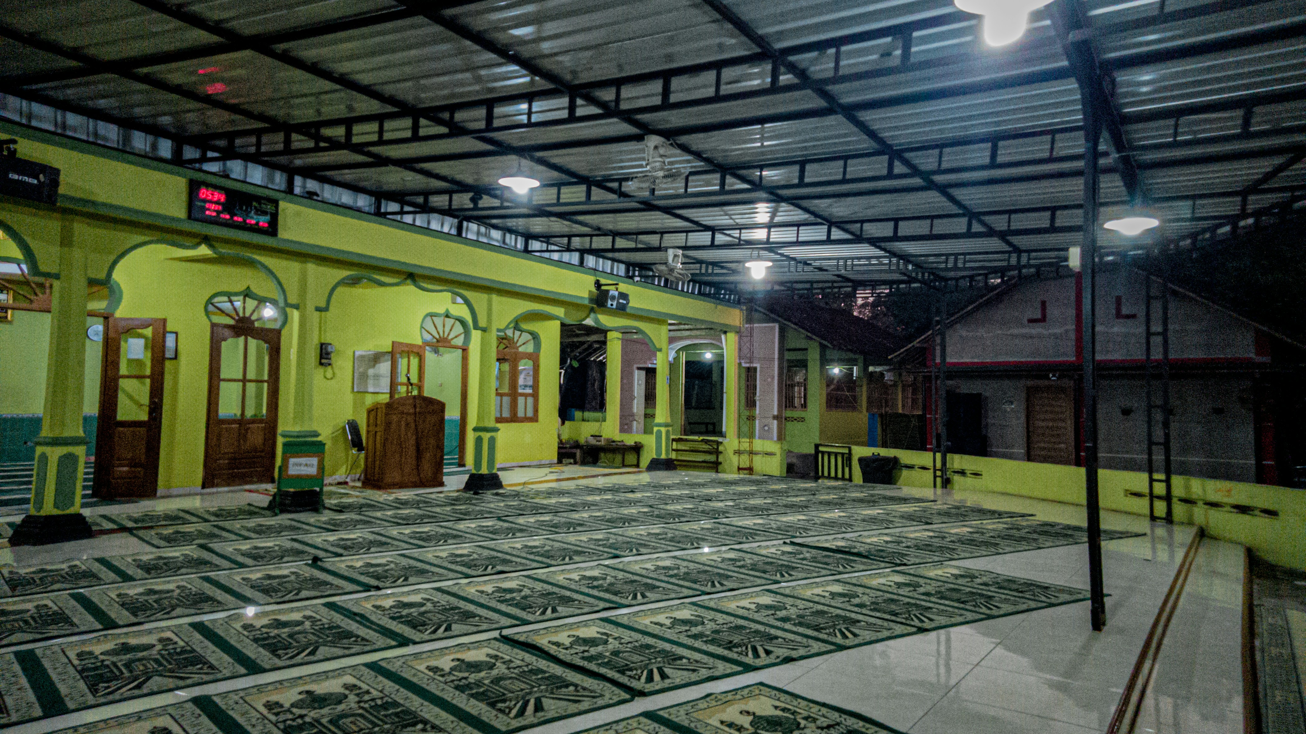 Quiet Colonial Hall: Yellow Facades and patterned Tiles