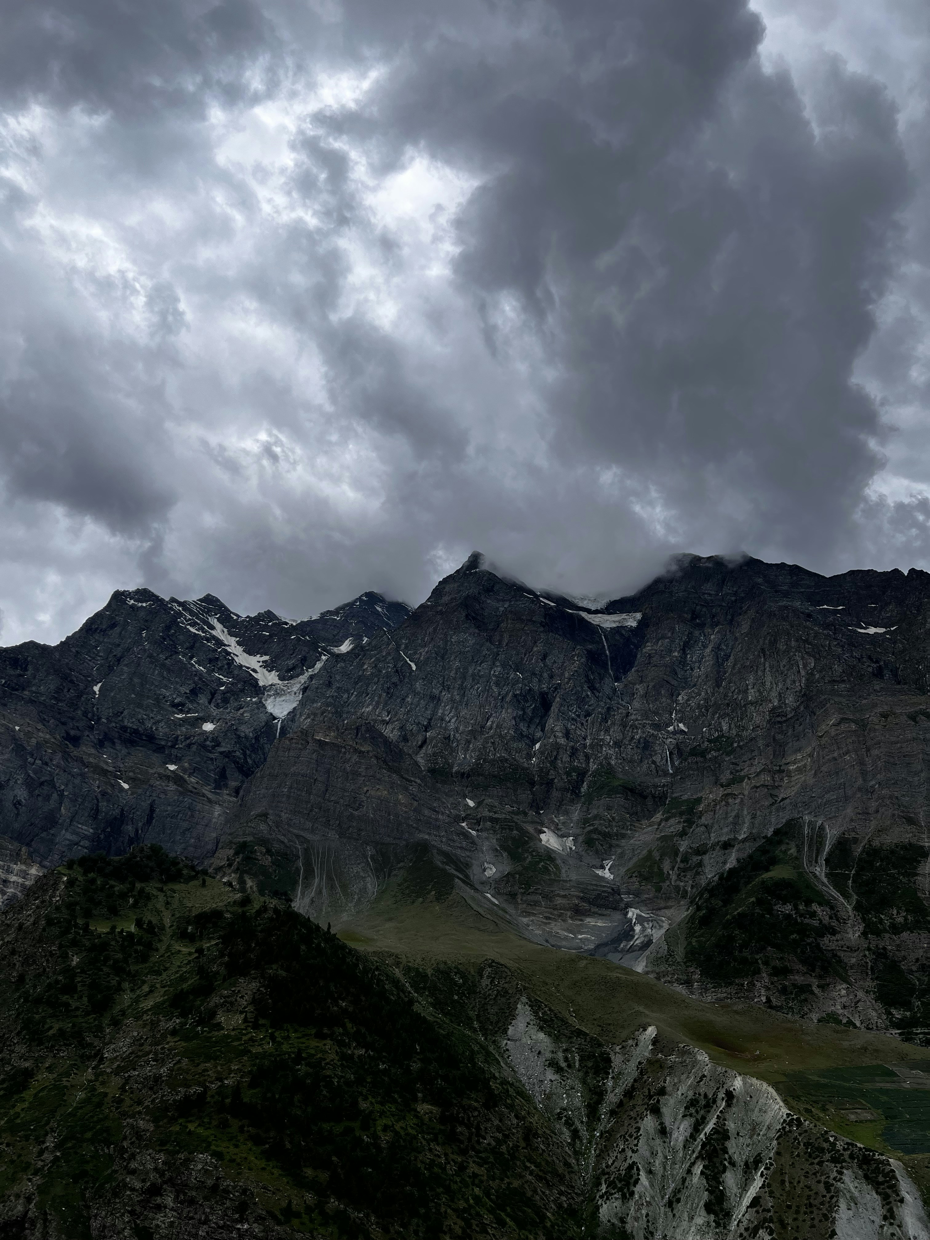 Storm-Soaked Peaks Beneath Heavy Skies
