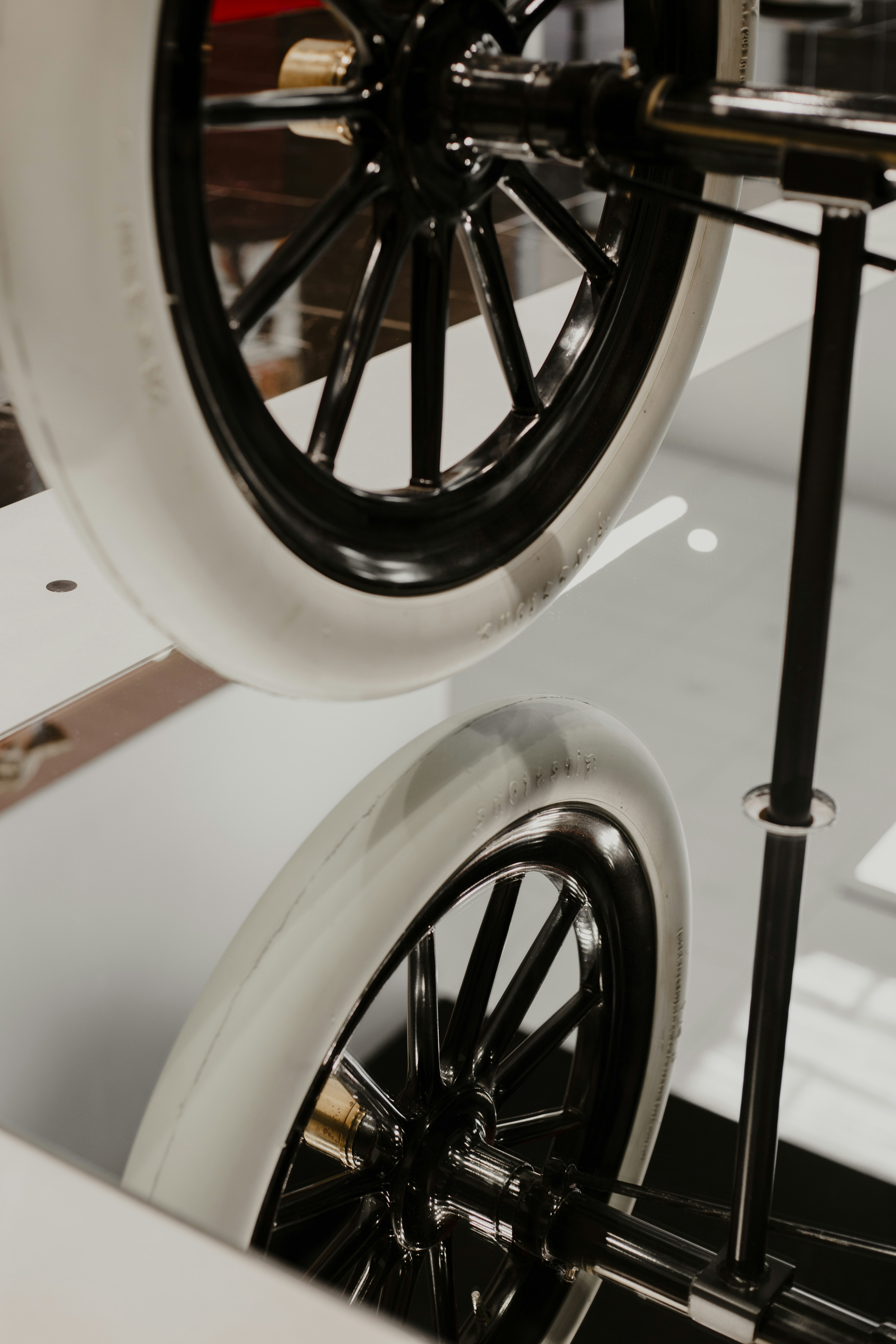 Symmetry in Steel: Dual Vintage Wheels on Display