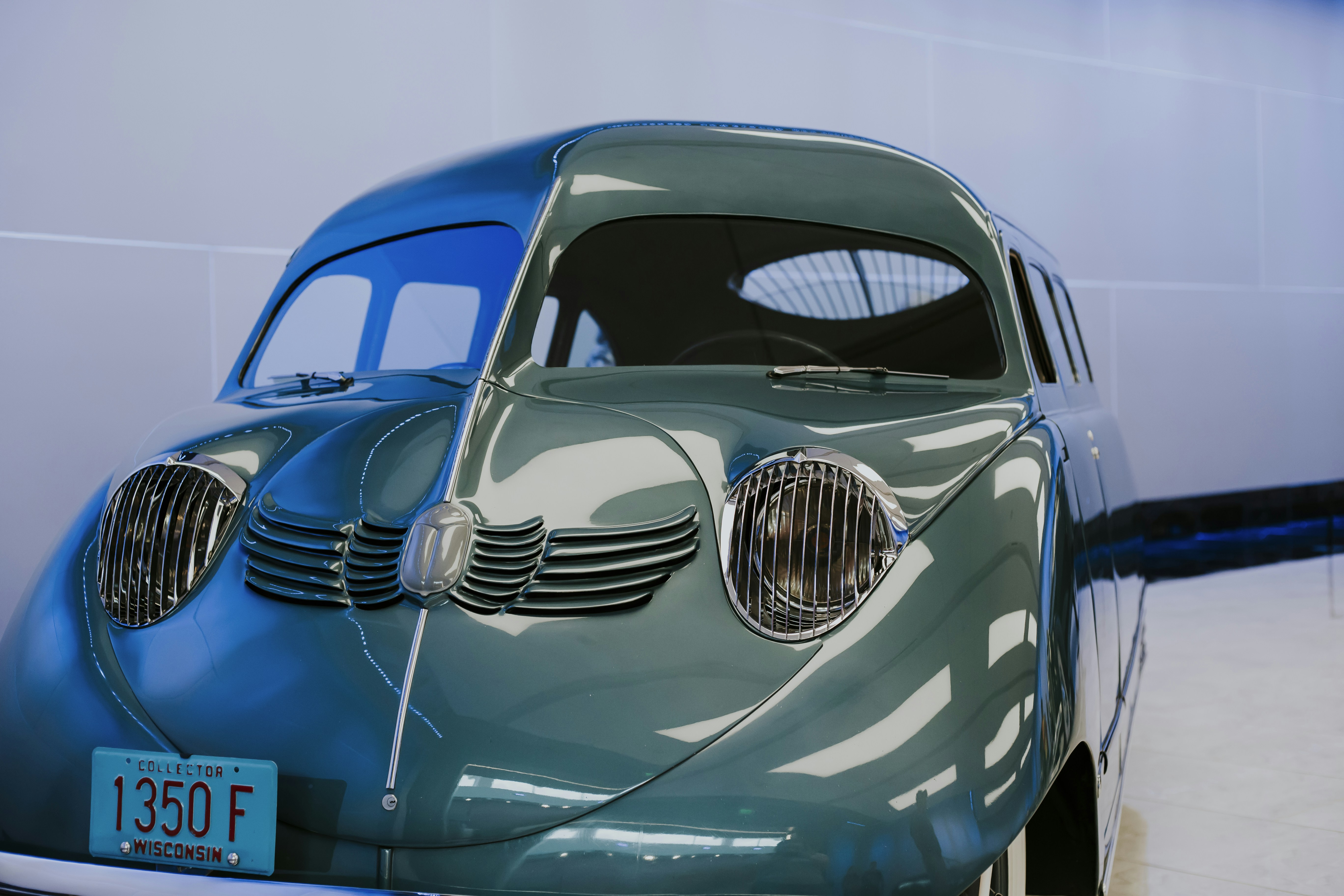 Chrome Grille and Teal Curves: A Curated Look at a Classic Automobile