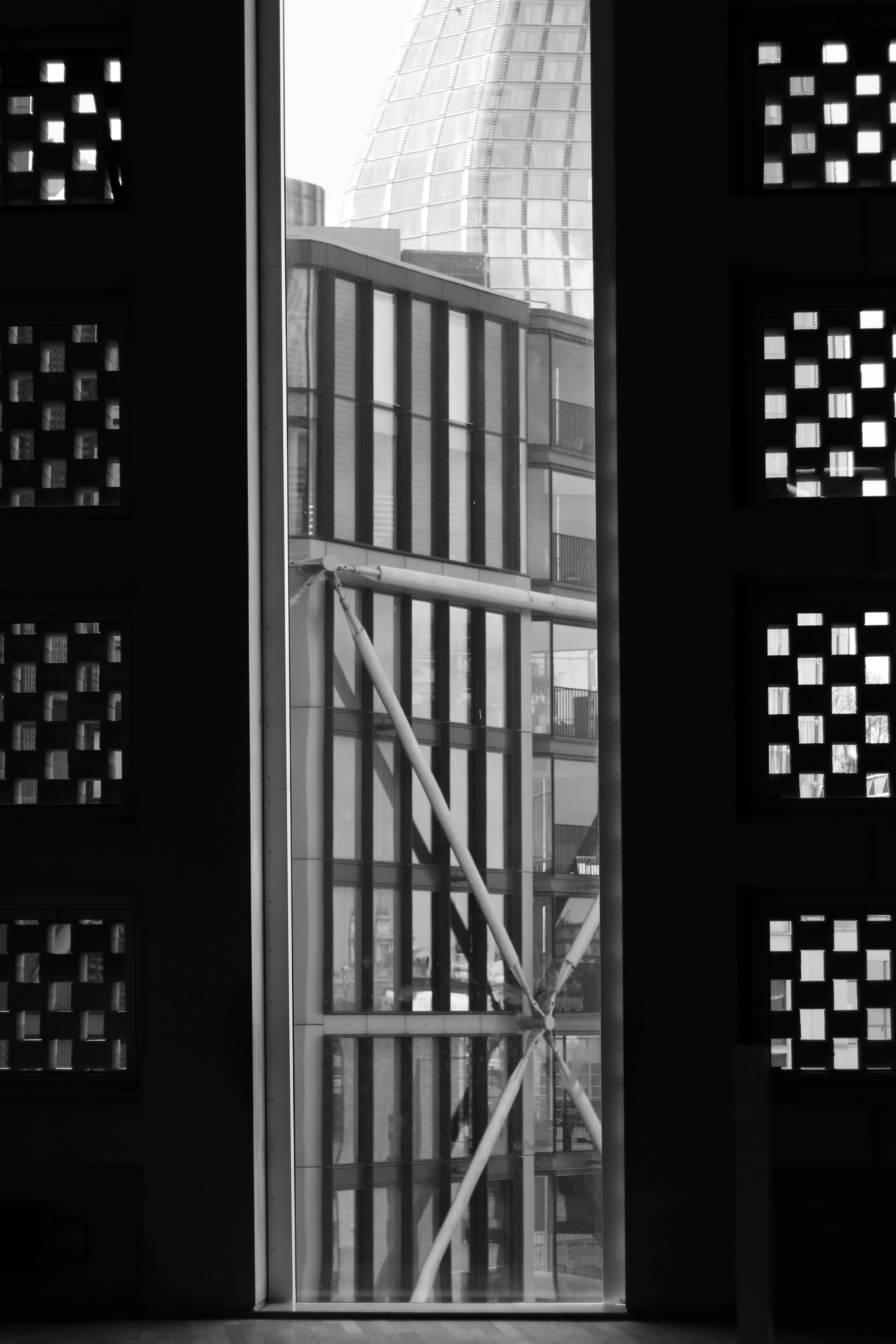 Architectural Dialogue: A Glimpse Through Modern Frames