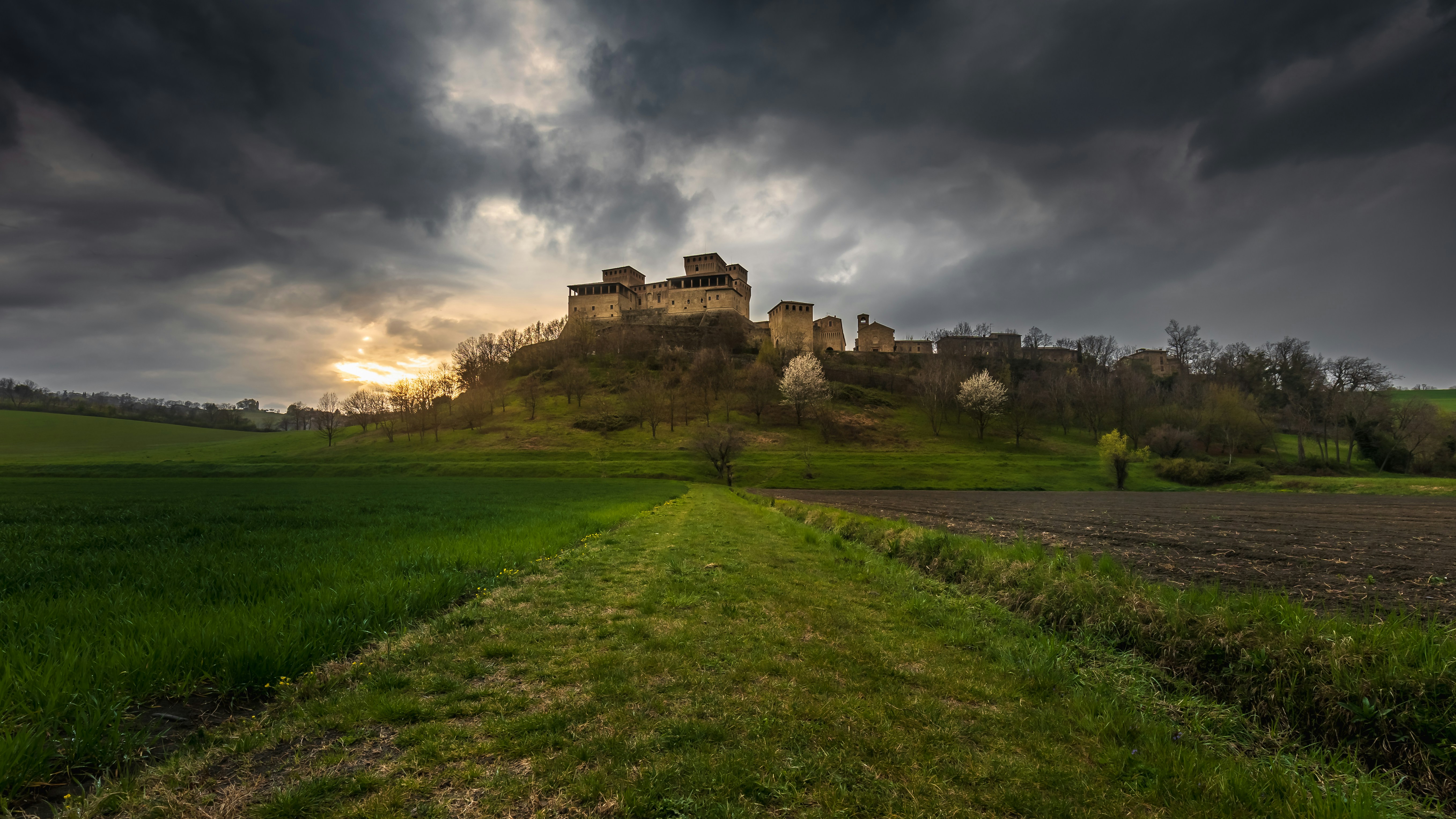 Fortress at Dusk: A Dramatic Skyscape