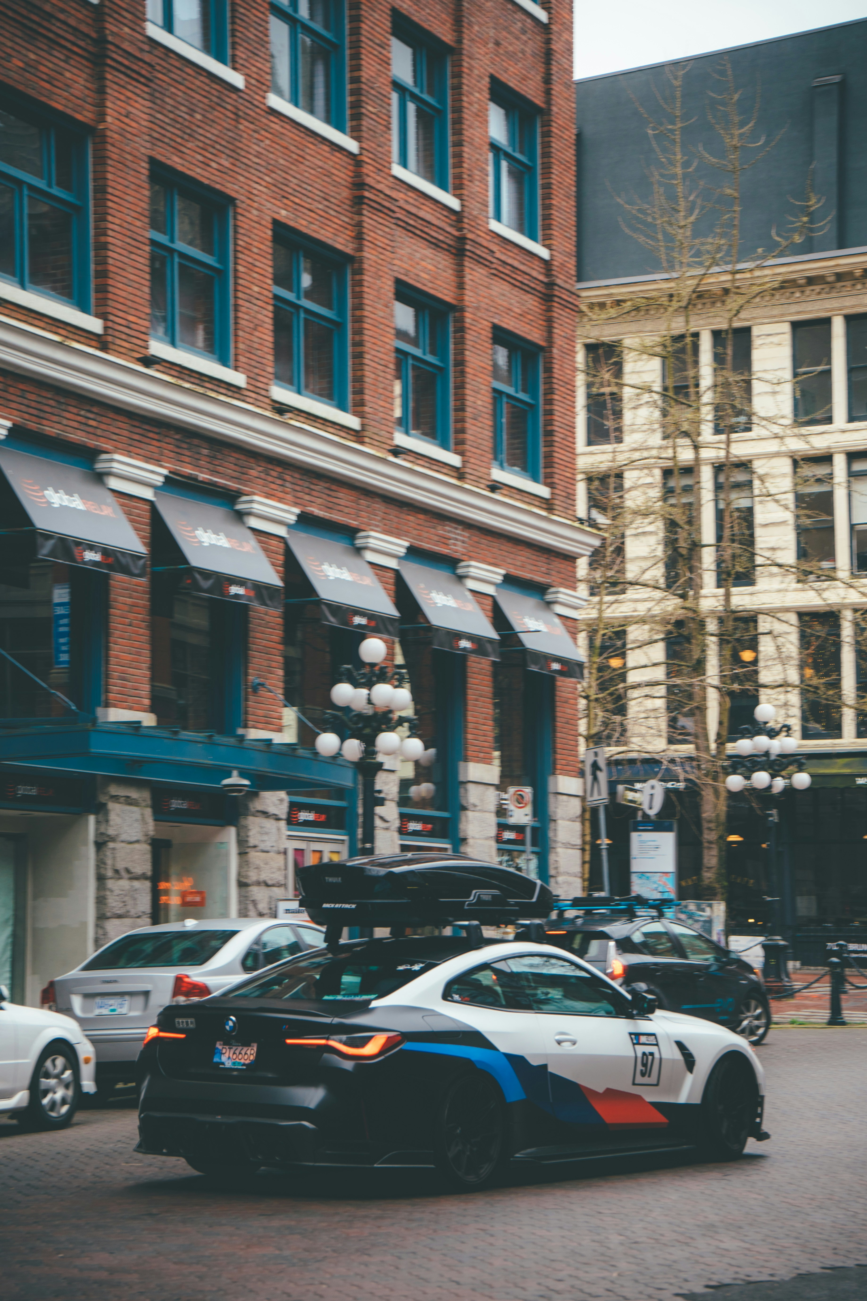 A police car parked in front of a building photo – Free Vancouver Image ...