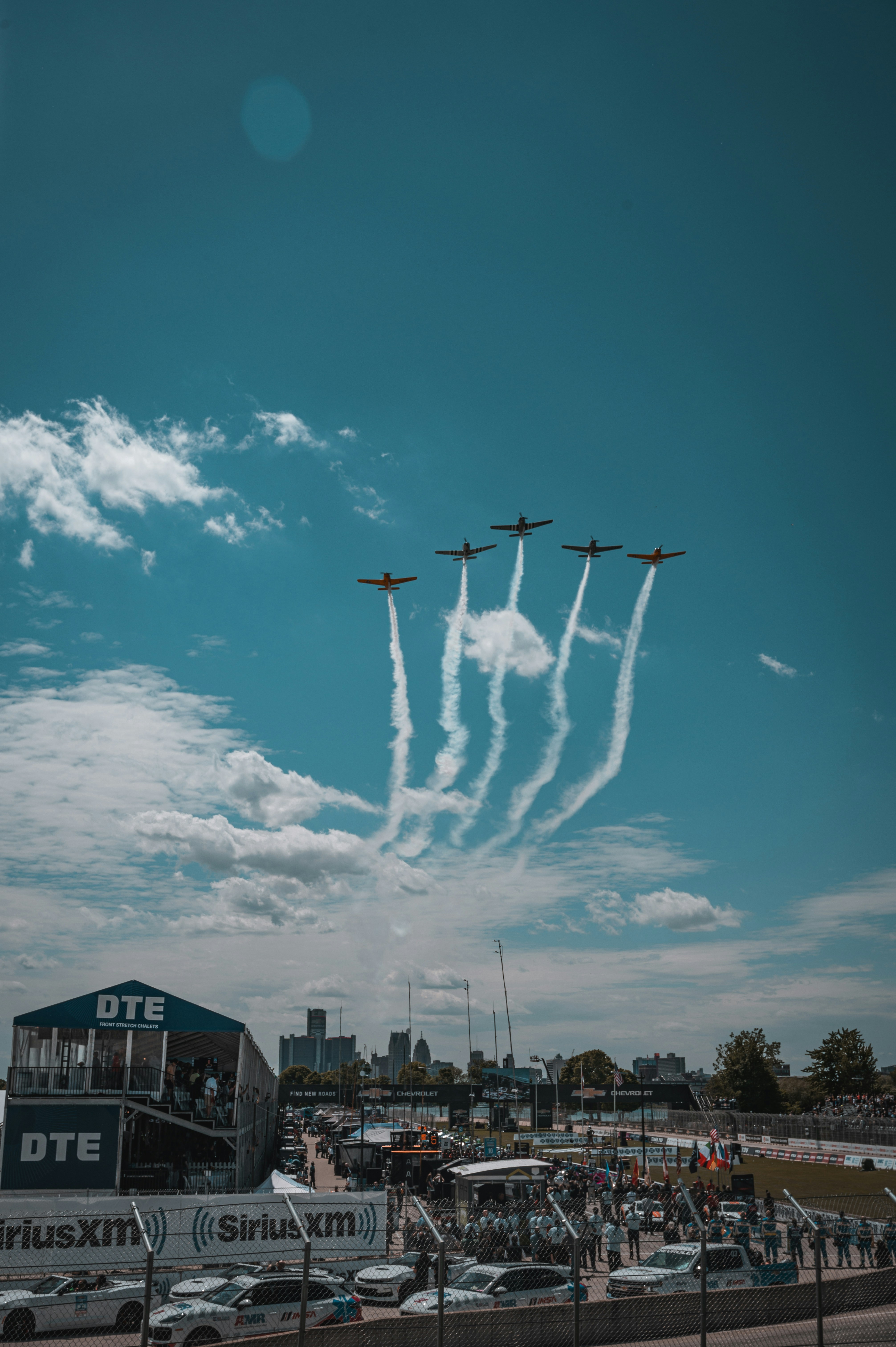 Five-Jet Smoke Opera Over a Waterfront Arena