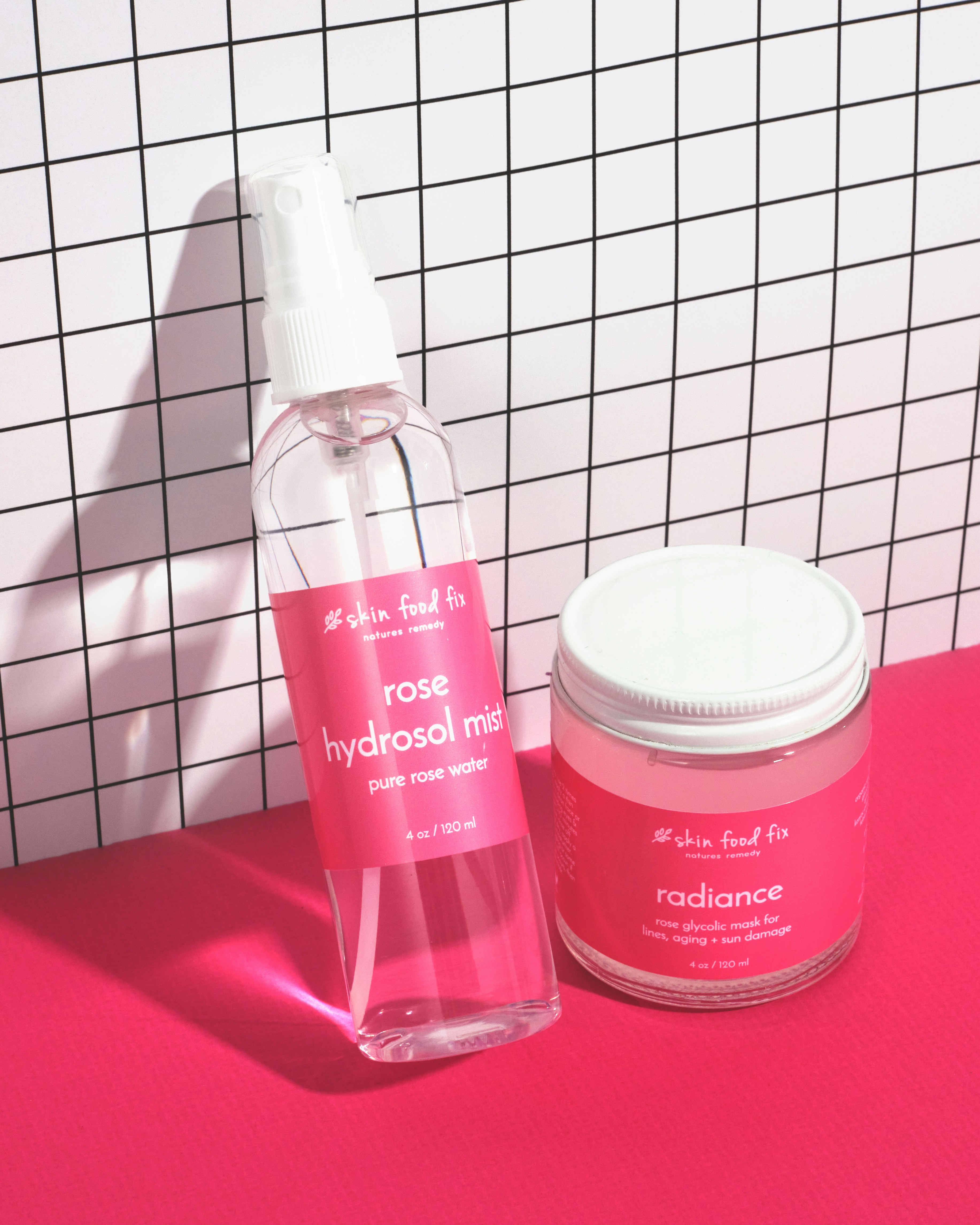 A pink bottle and a small pink container on a pink surface photo – Free ...