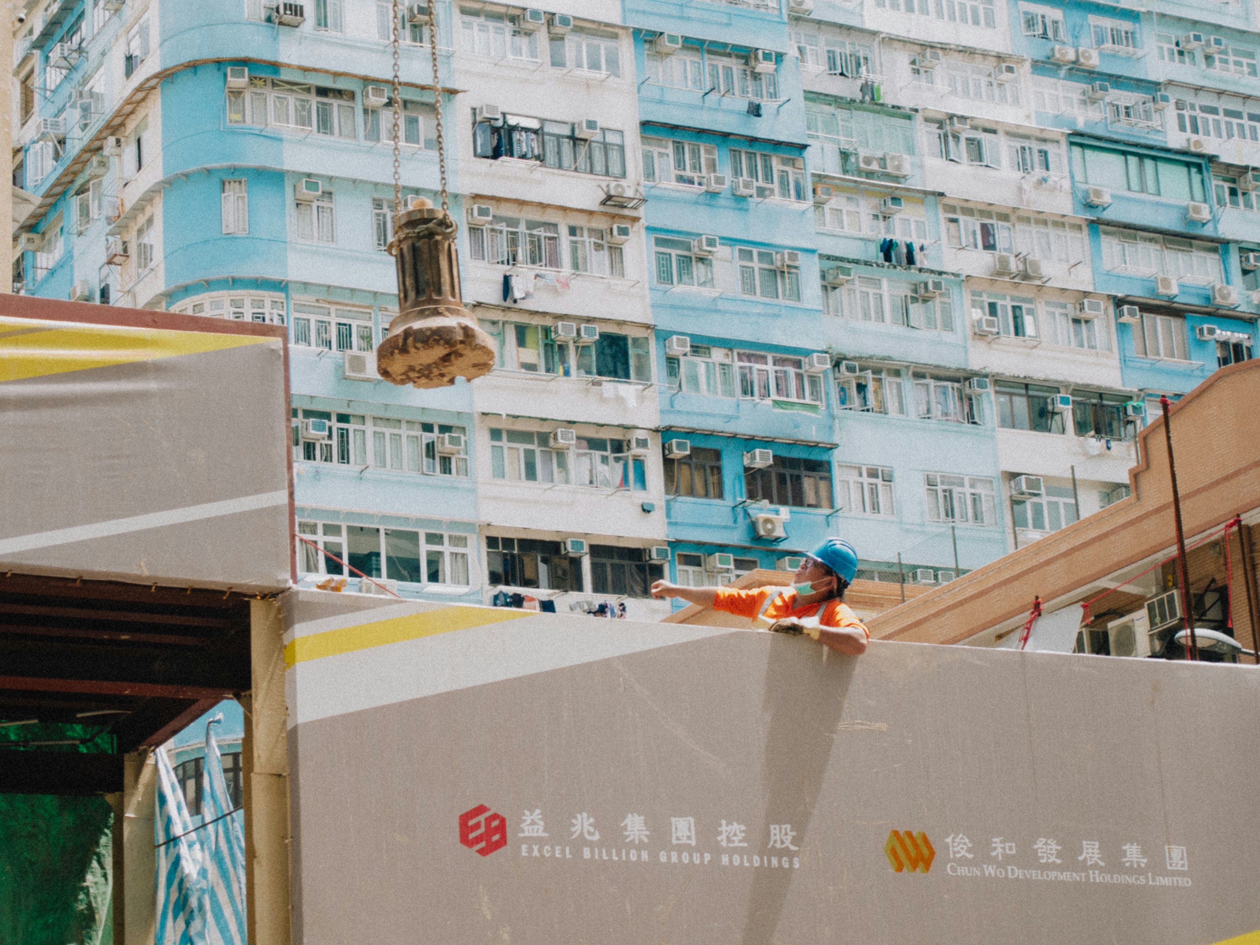 Rooftop Work in a Cyan-Block Paradise