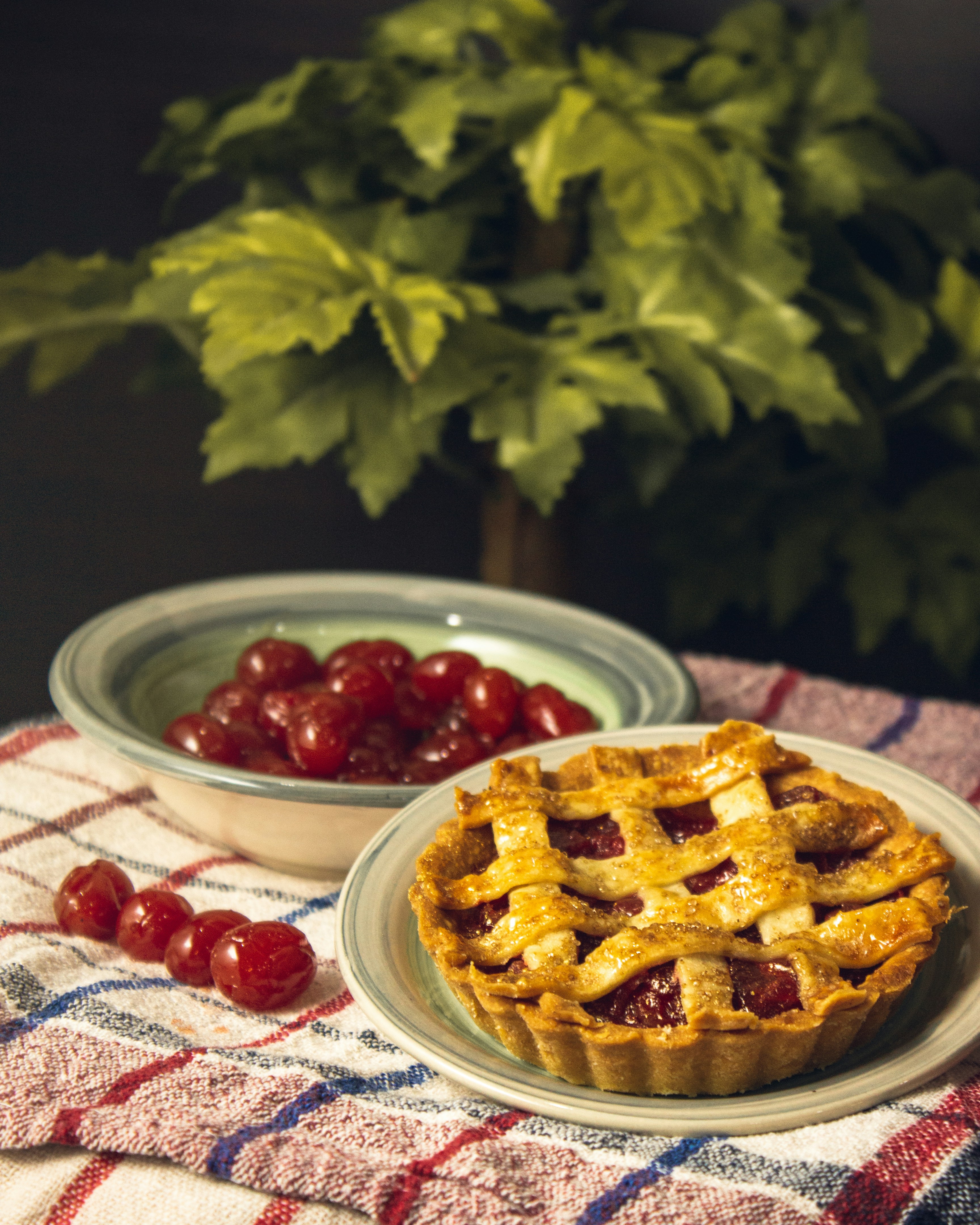 Golden Lattice Cherry Pie on a Cozy Checkered Table