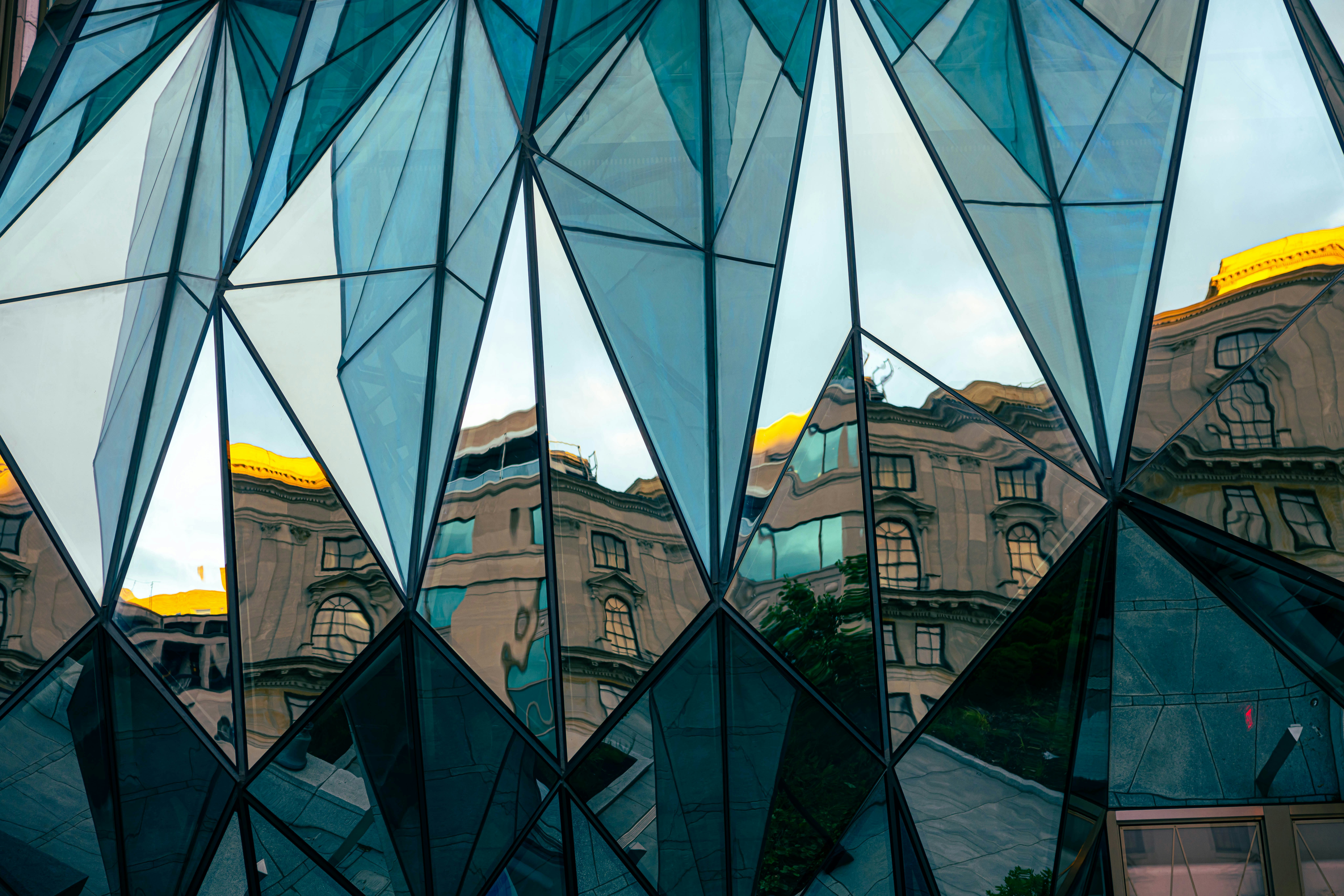 Diamond Facade Prism: Reflections in a Blue Glass Tessellation