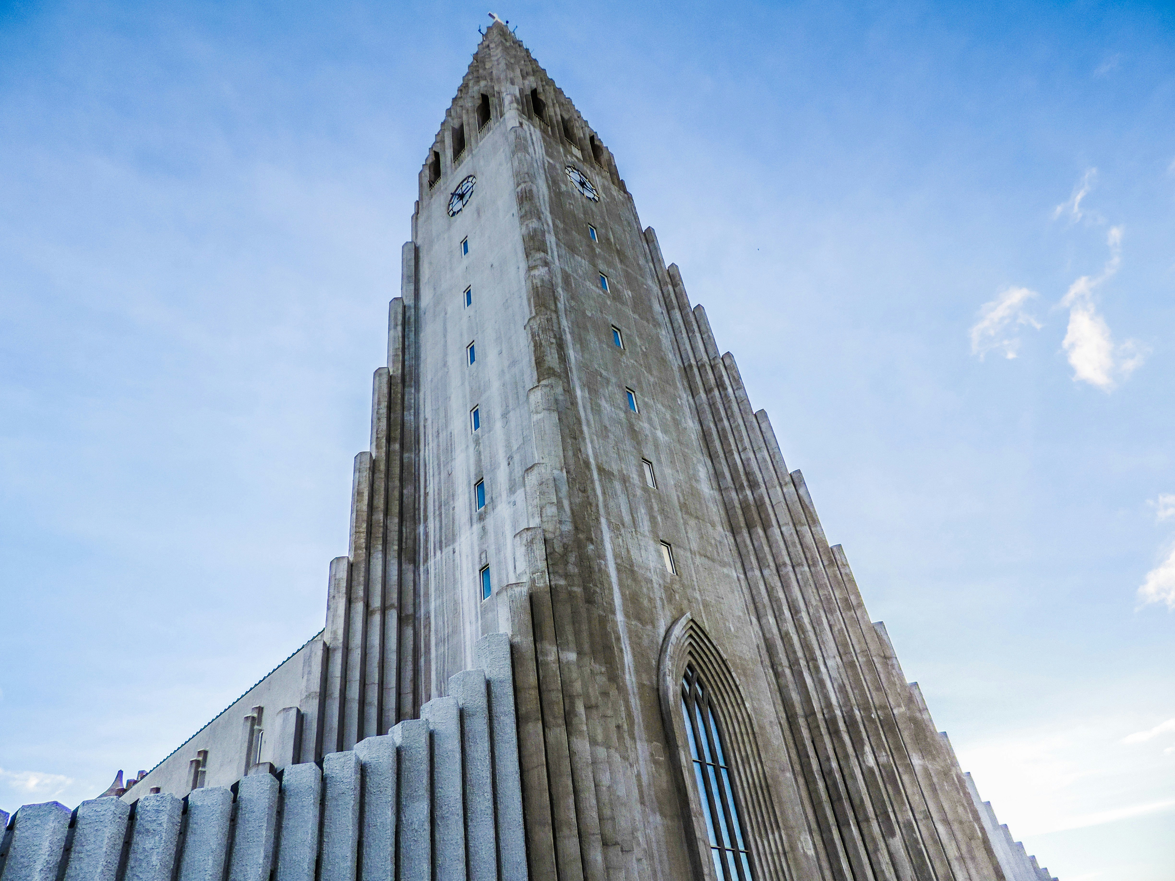 A large stone building with a clock tower photo – Free Reykjavík Image ...