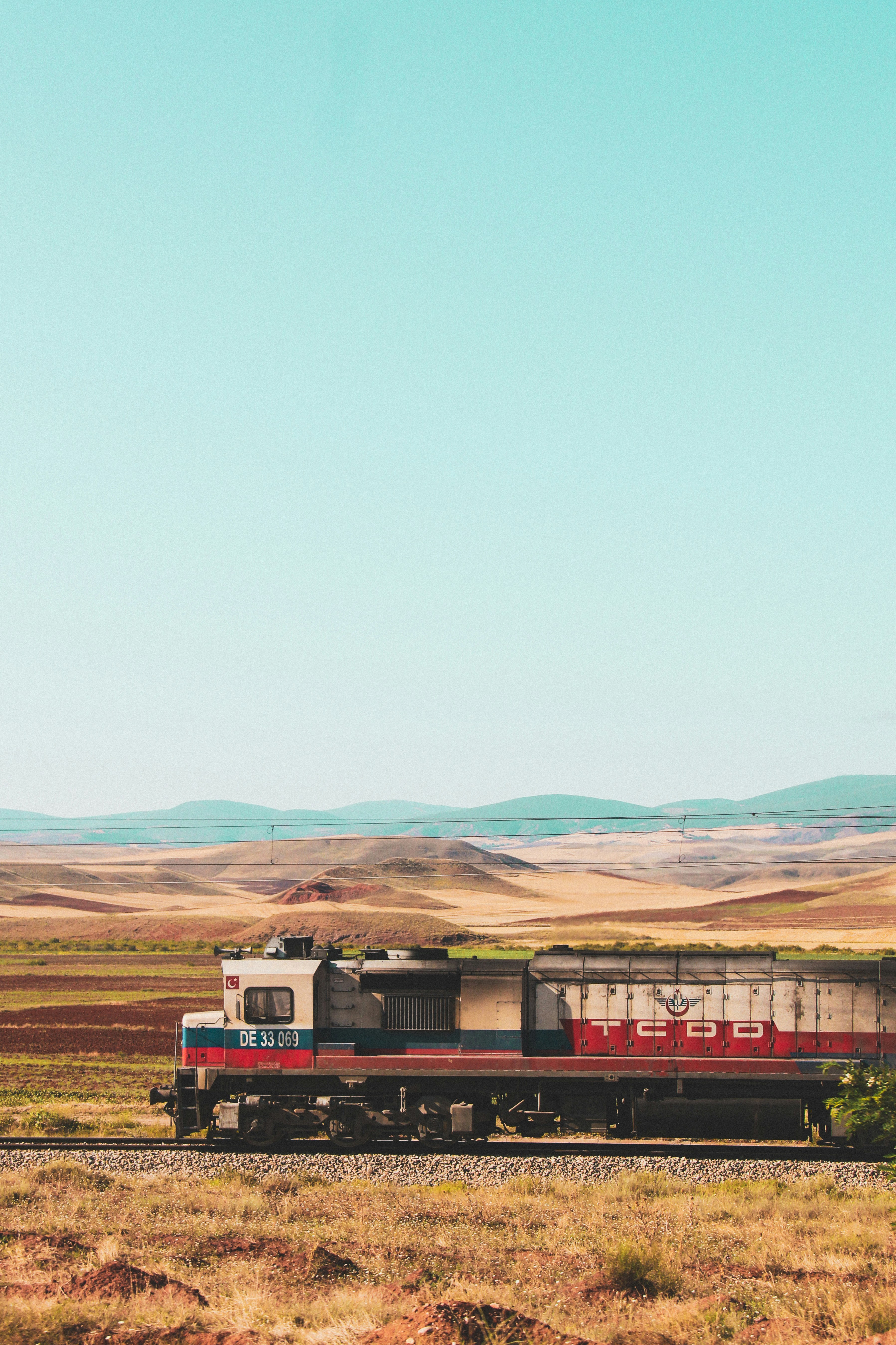 Iron Serpent on Rails: Desert Vista under Wide Sky