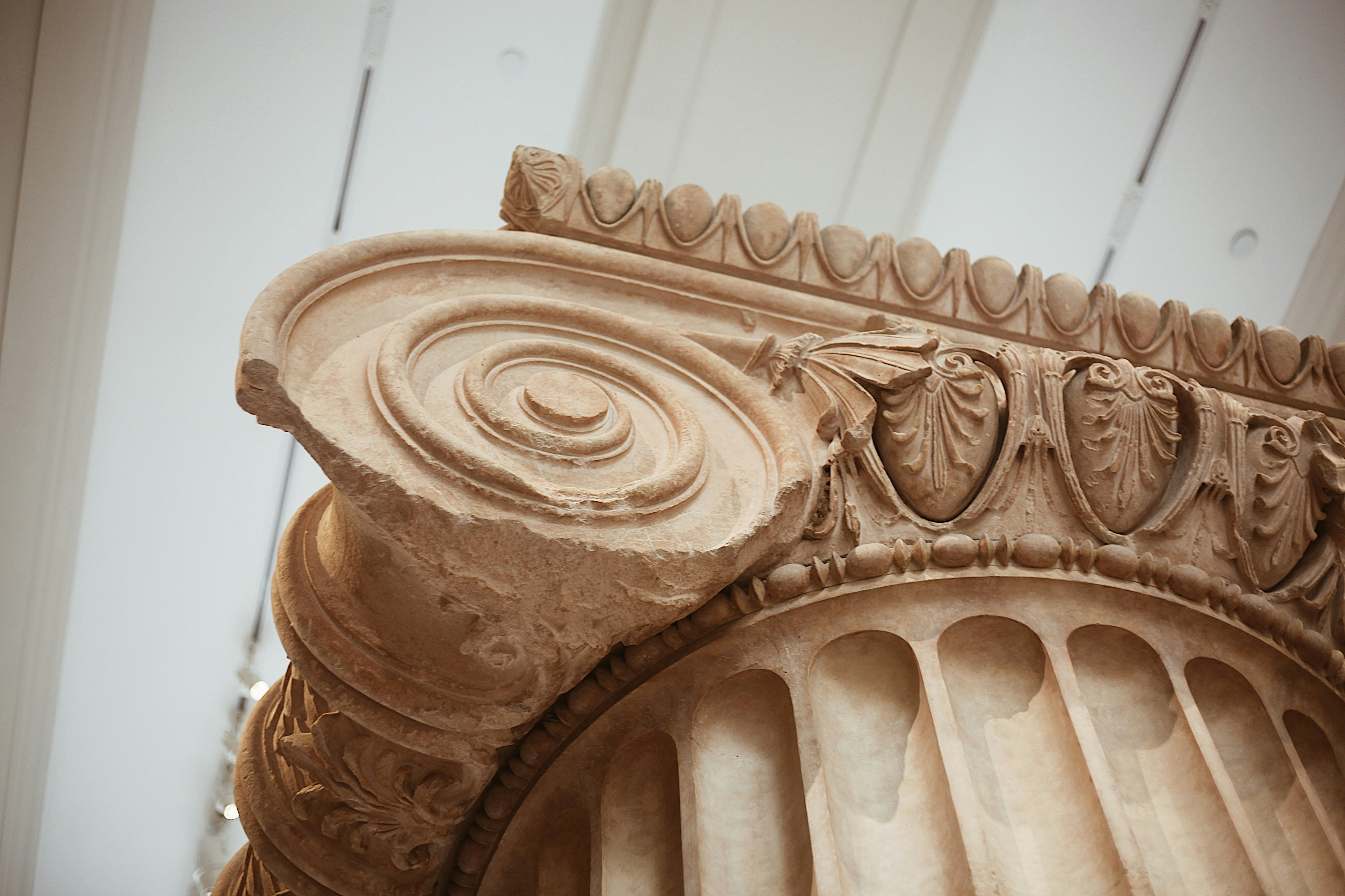 Carved Capital in Warm Light: A Fragment of Classical Detail