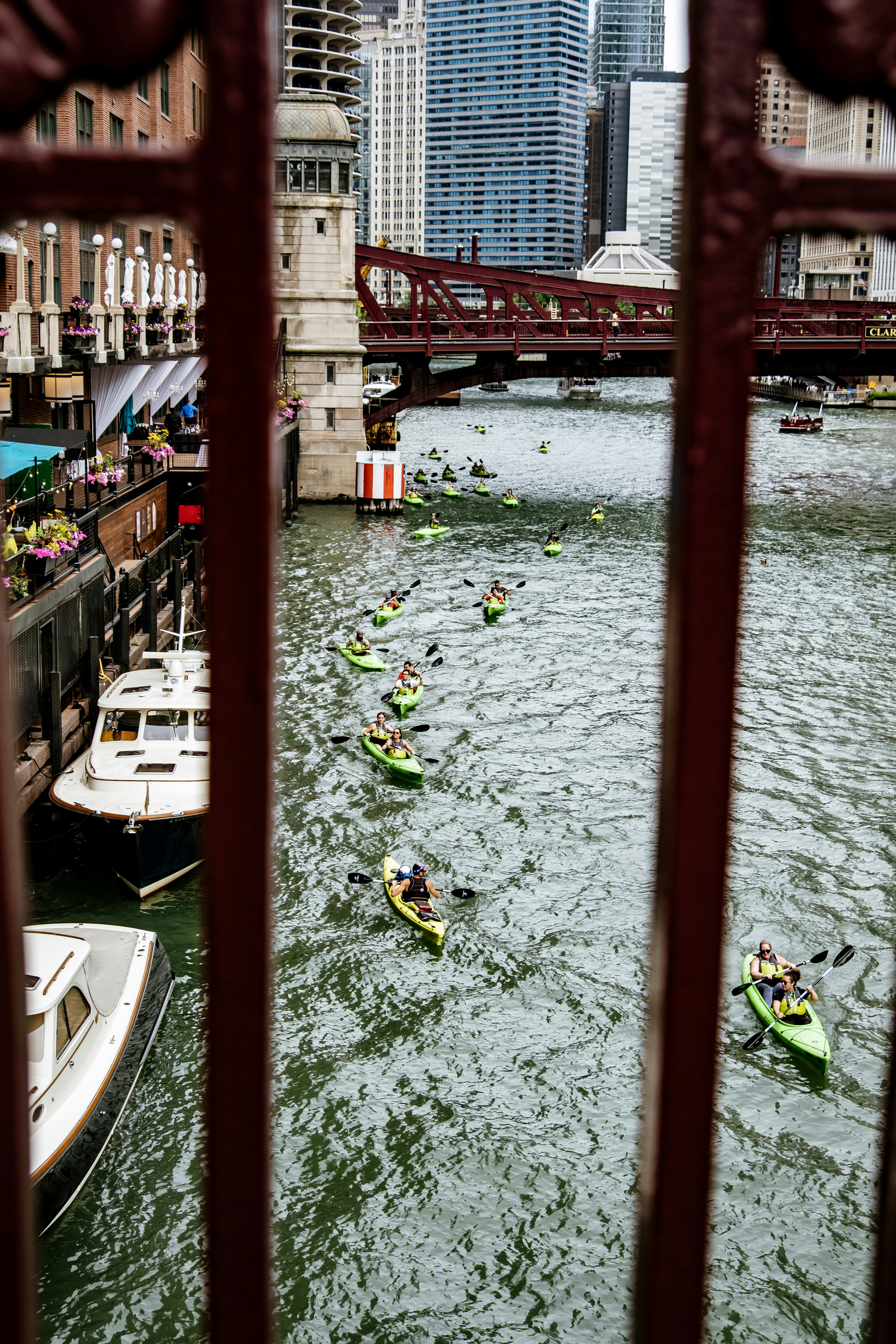 a group of people in kayaks in a river