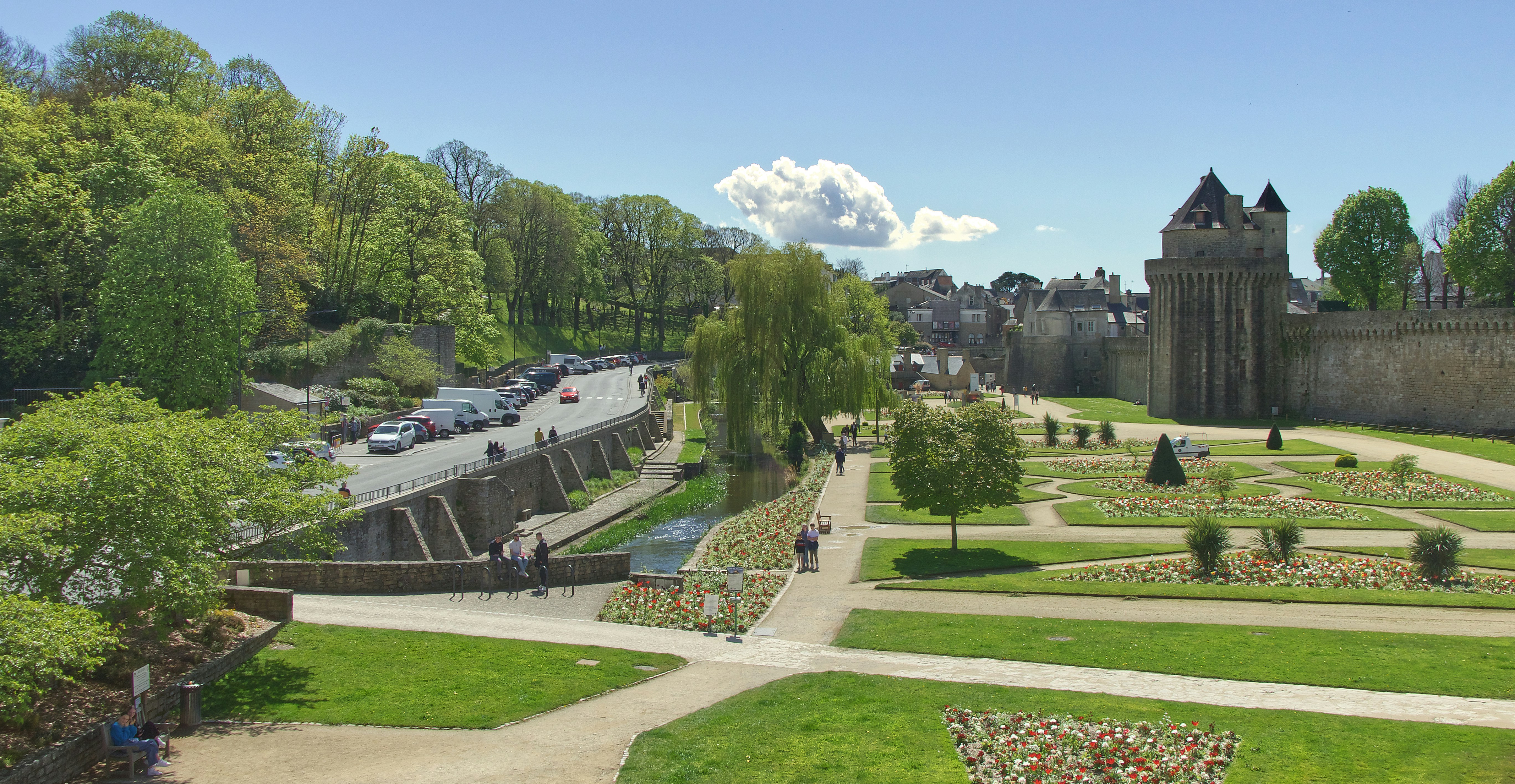 Sunlit Citadel Gardens: Parterres, Walls, and a Tower