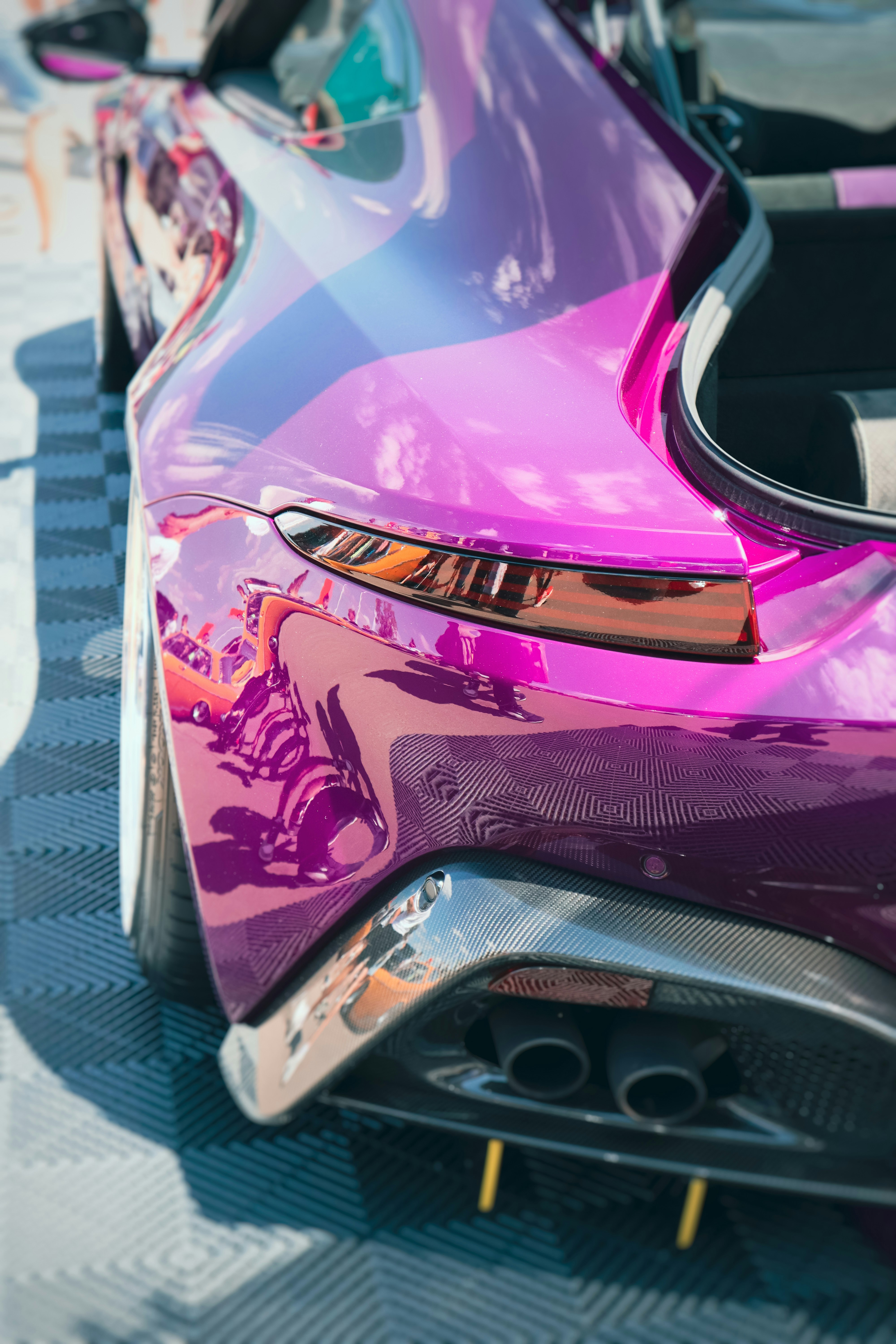 Violet Velocity: Reflections on a Glossy Rear Quarter