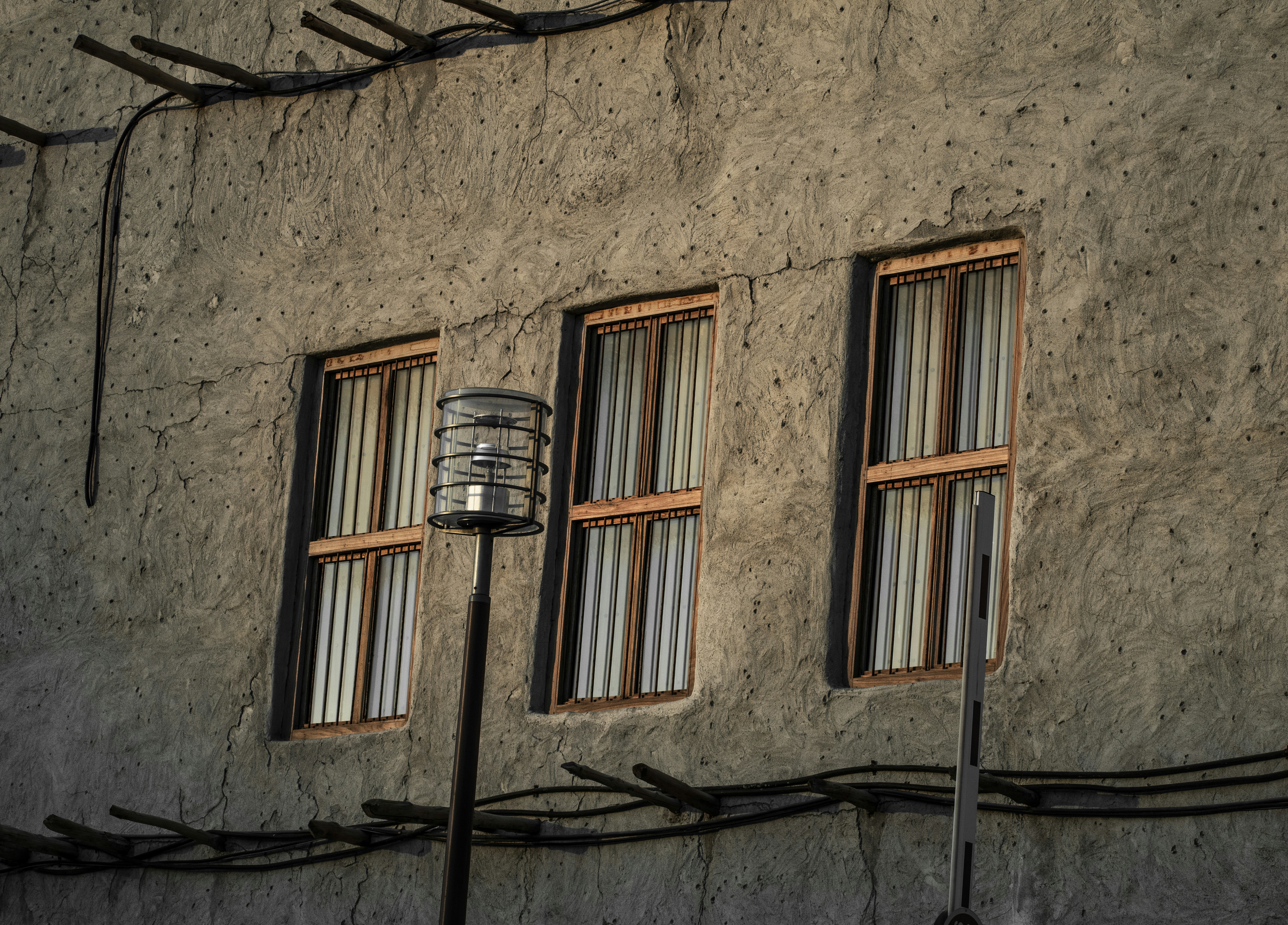 a bird feeder in front of a window