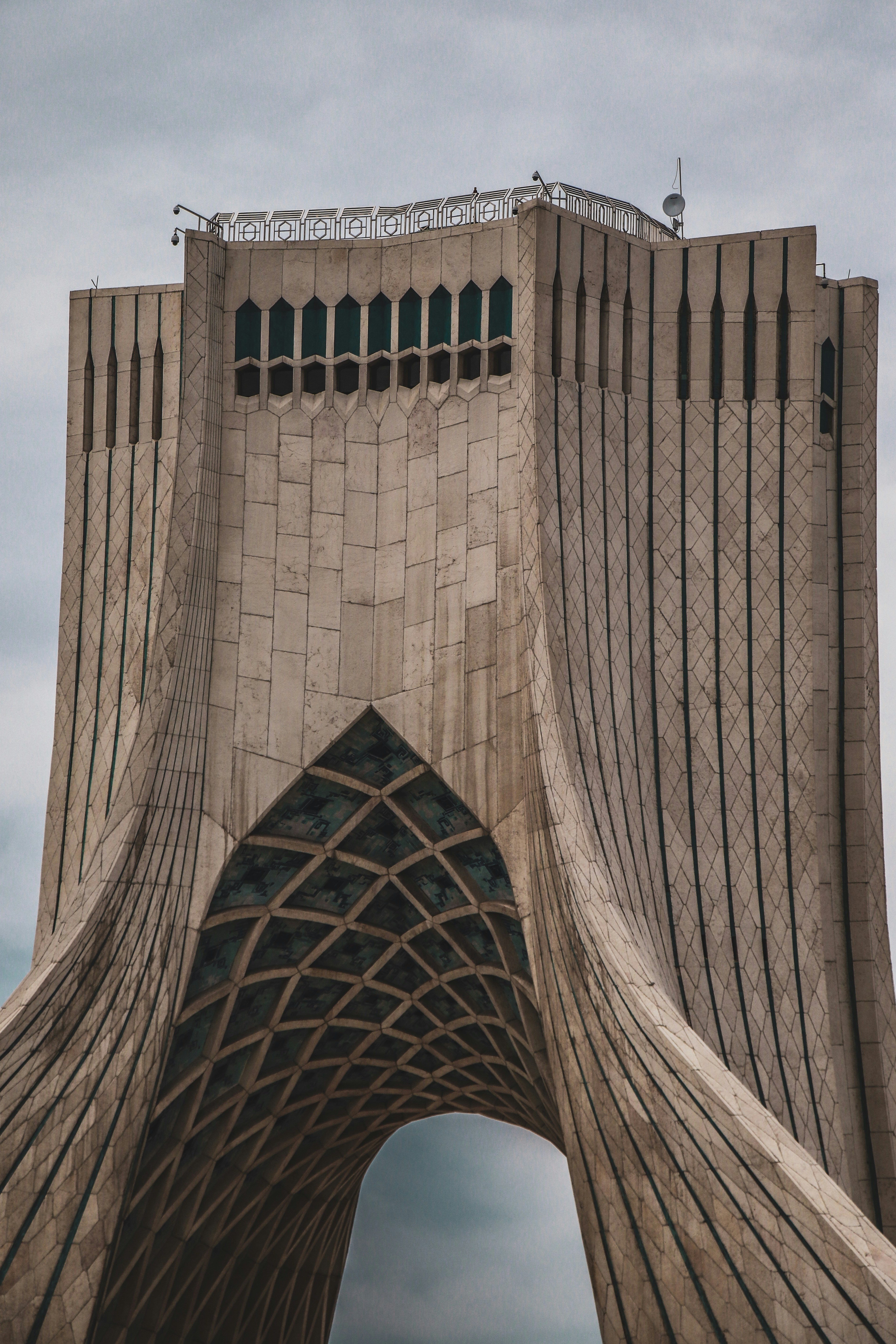 A tall tower with a bridge photo – Free Tehran Image on Unsplash