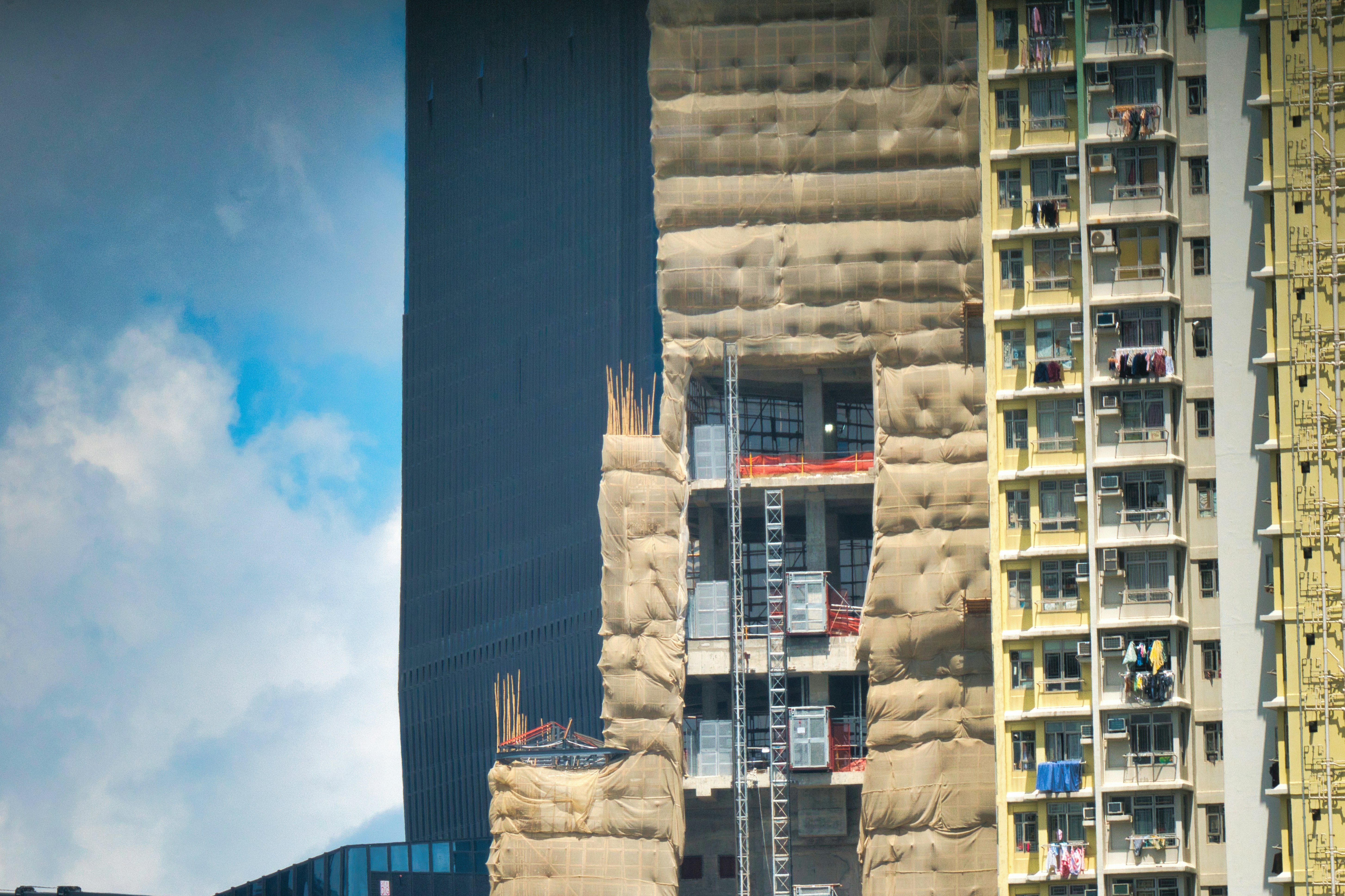 Facade Under Construction: A Layered Slice of Urban Renewal