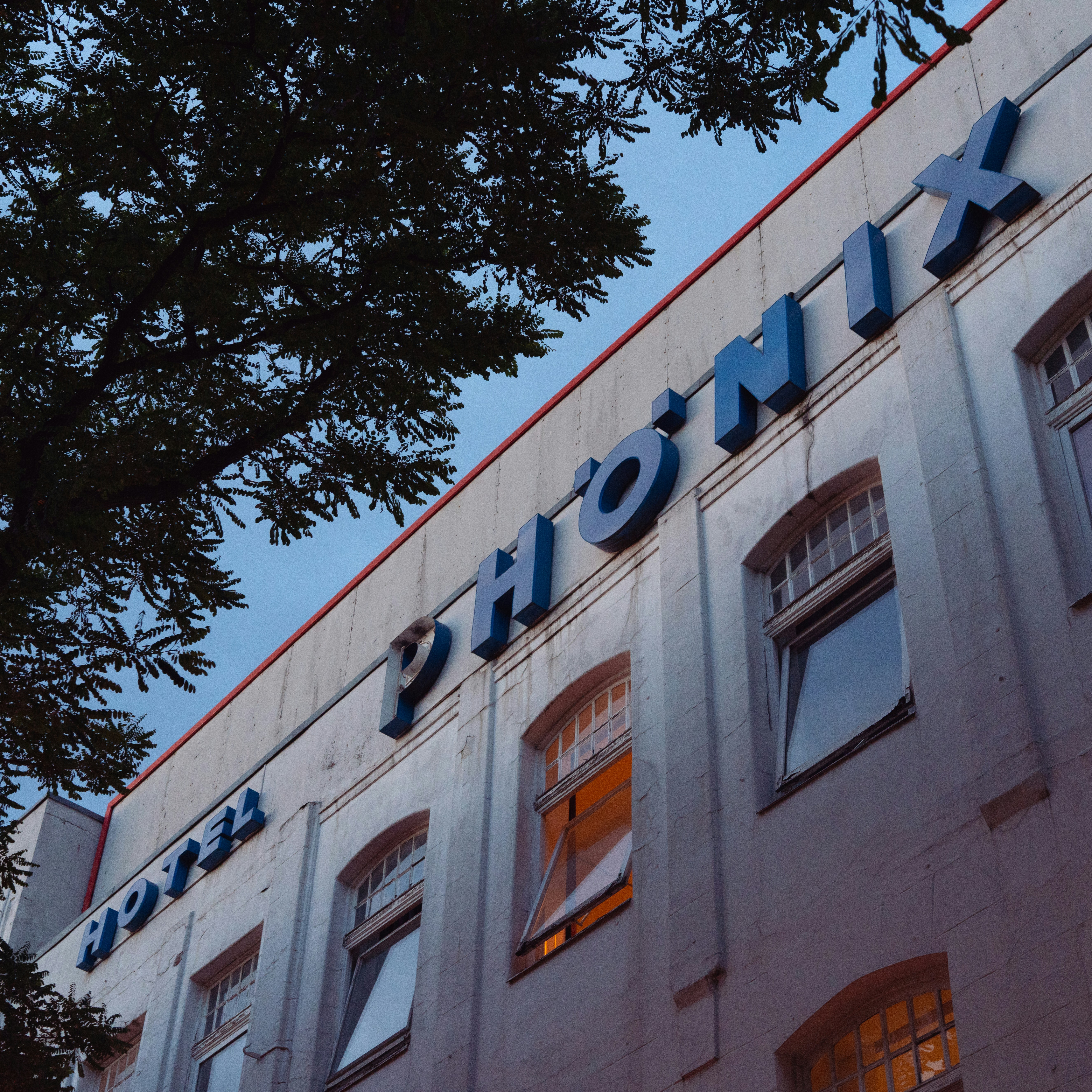 A building with blue letters on it photo – Free Hamburg Image on Unsplash