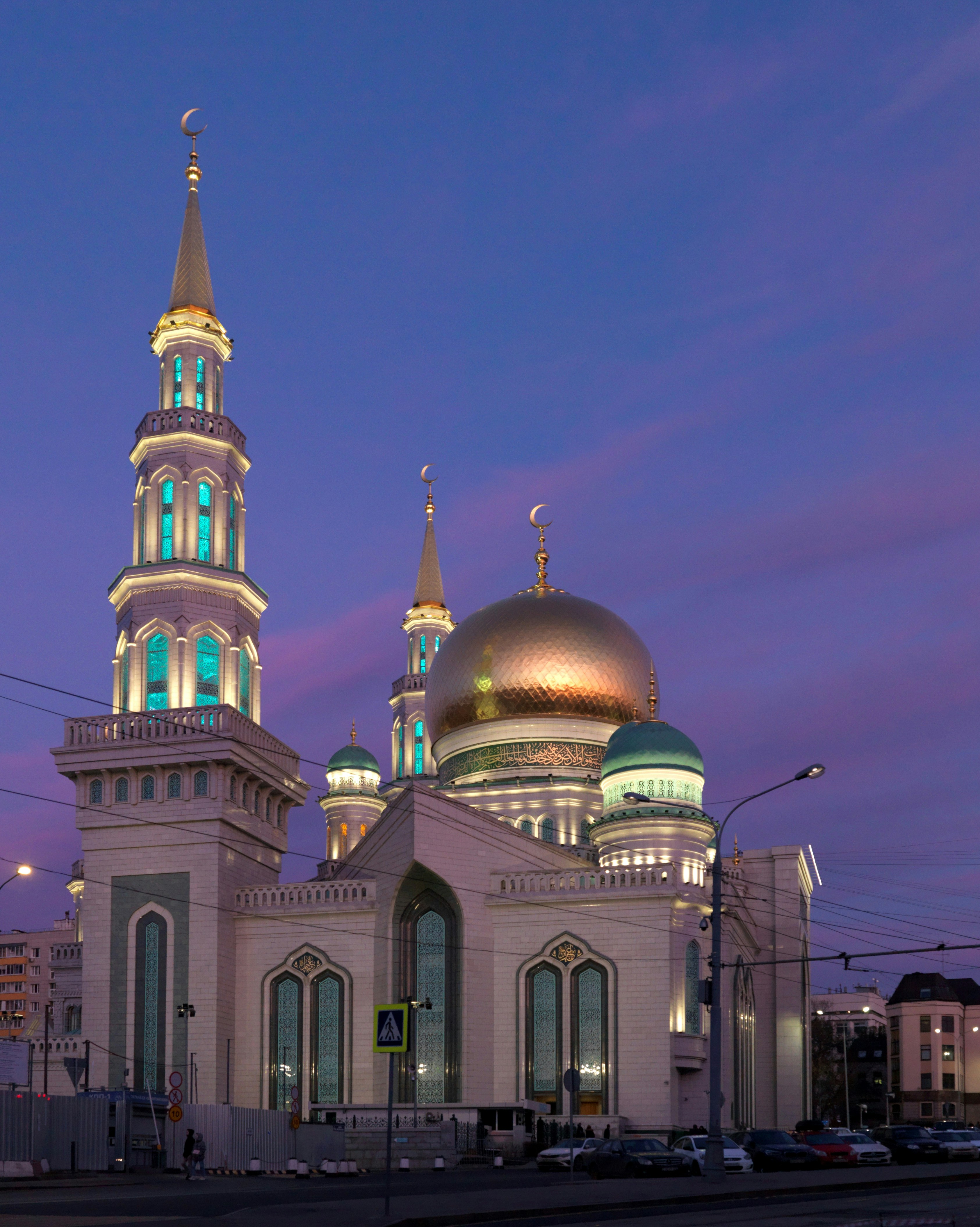 Twilight Dome: Turquoise Minarets Framing a Golden Mosque