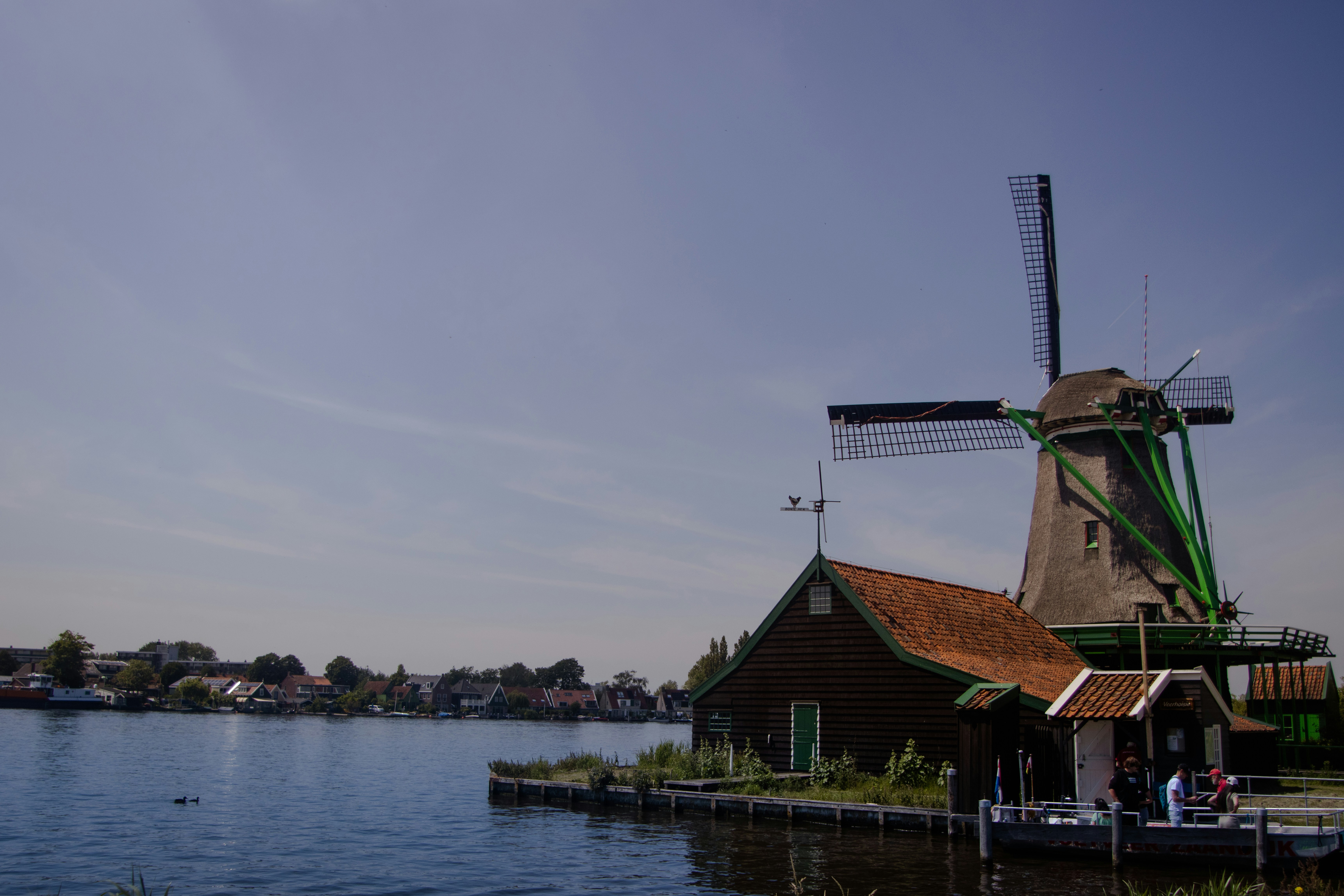 a building next to a body of water