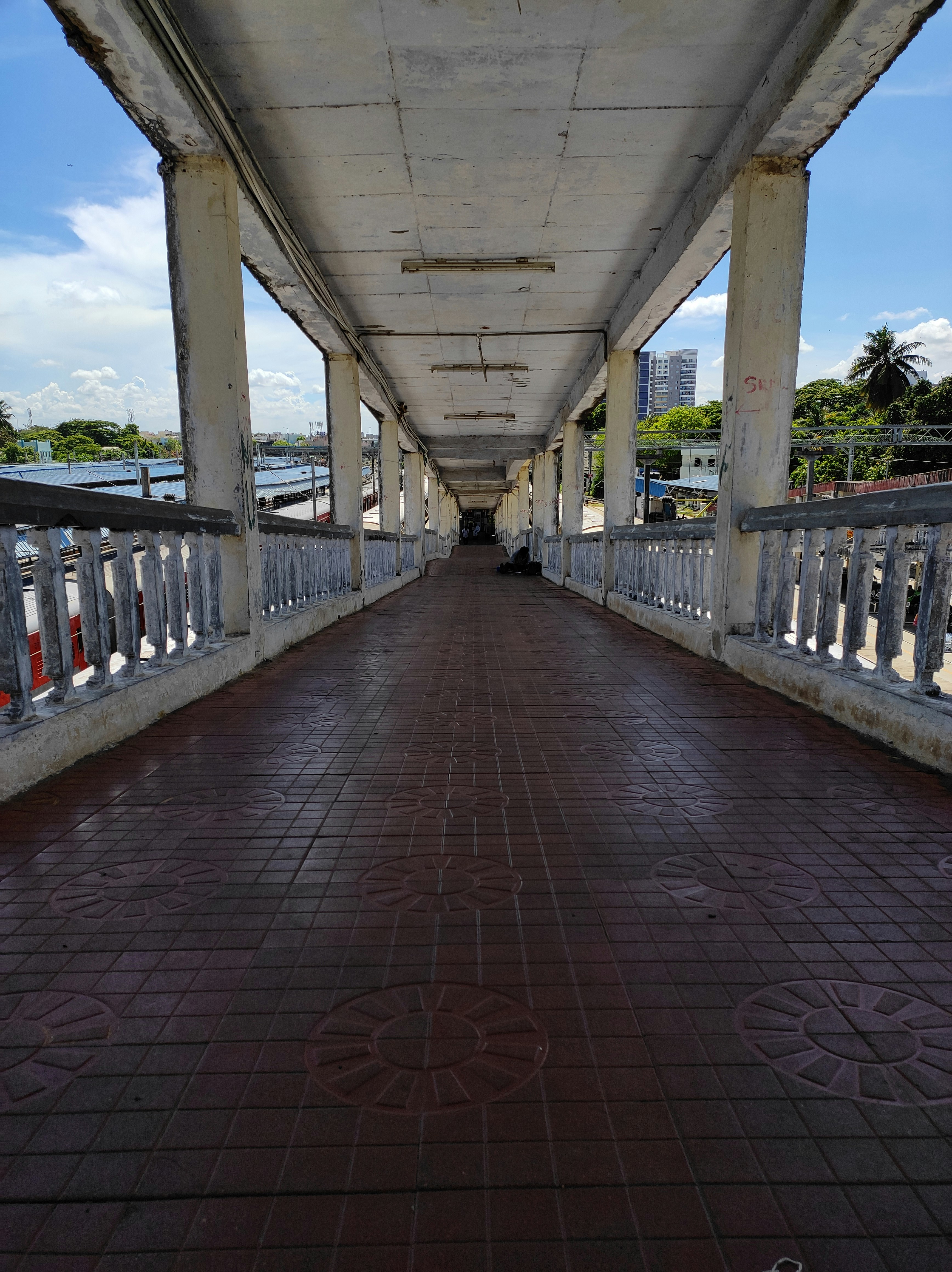 Vanishing Perspective along a Riverside Covered Pier