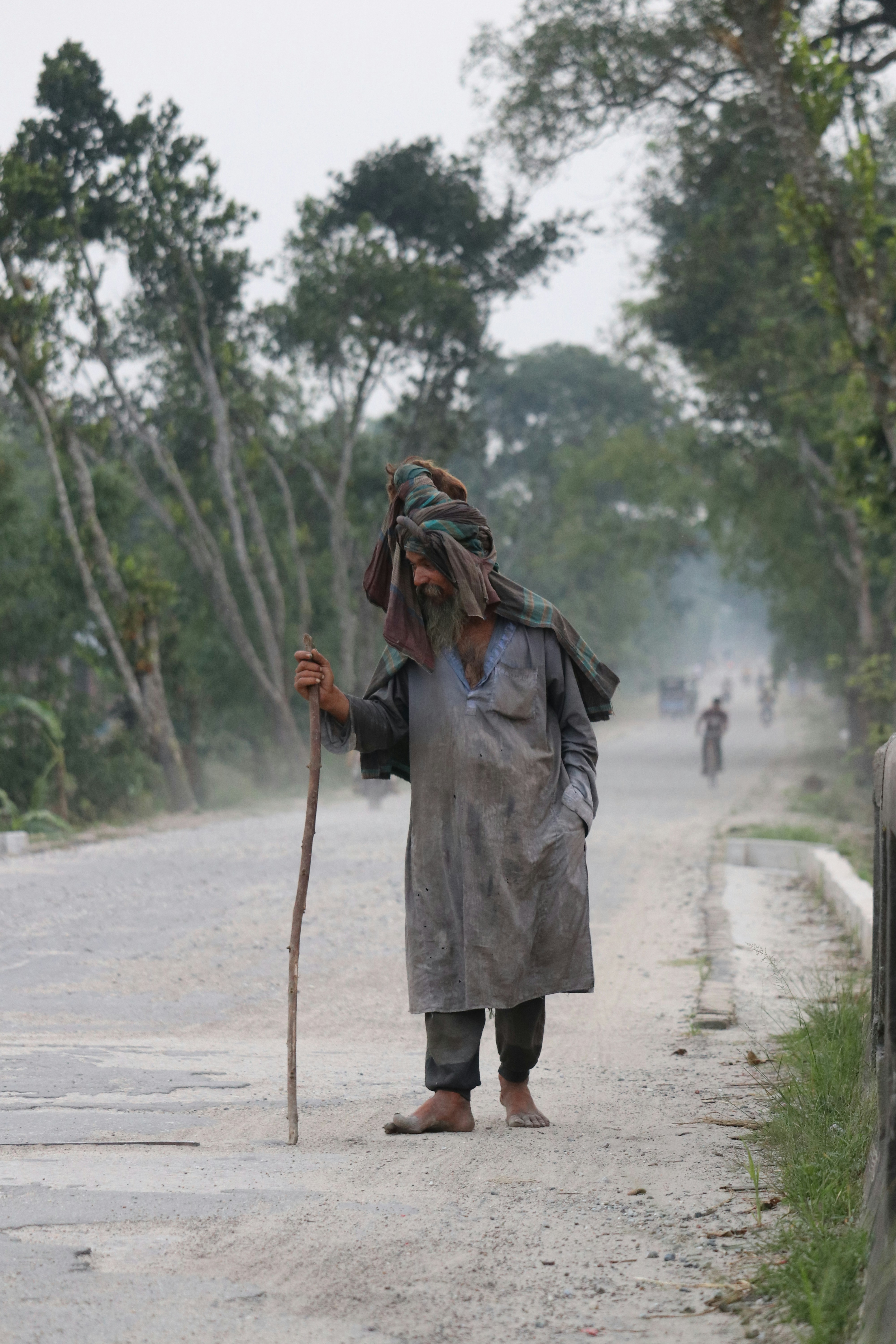 A person walking on a path photo – Free Human Image on Unsplash