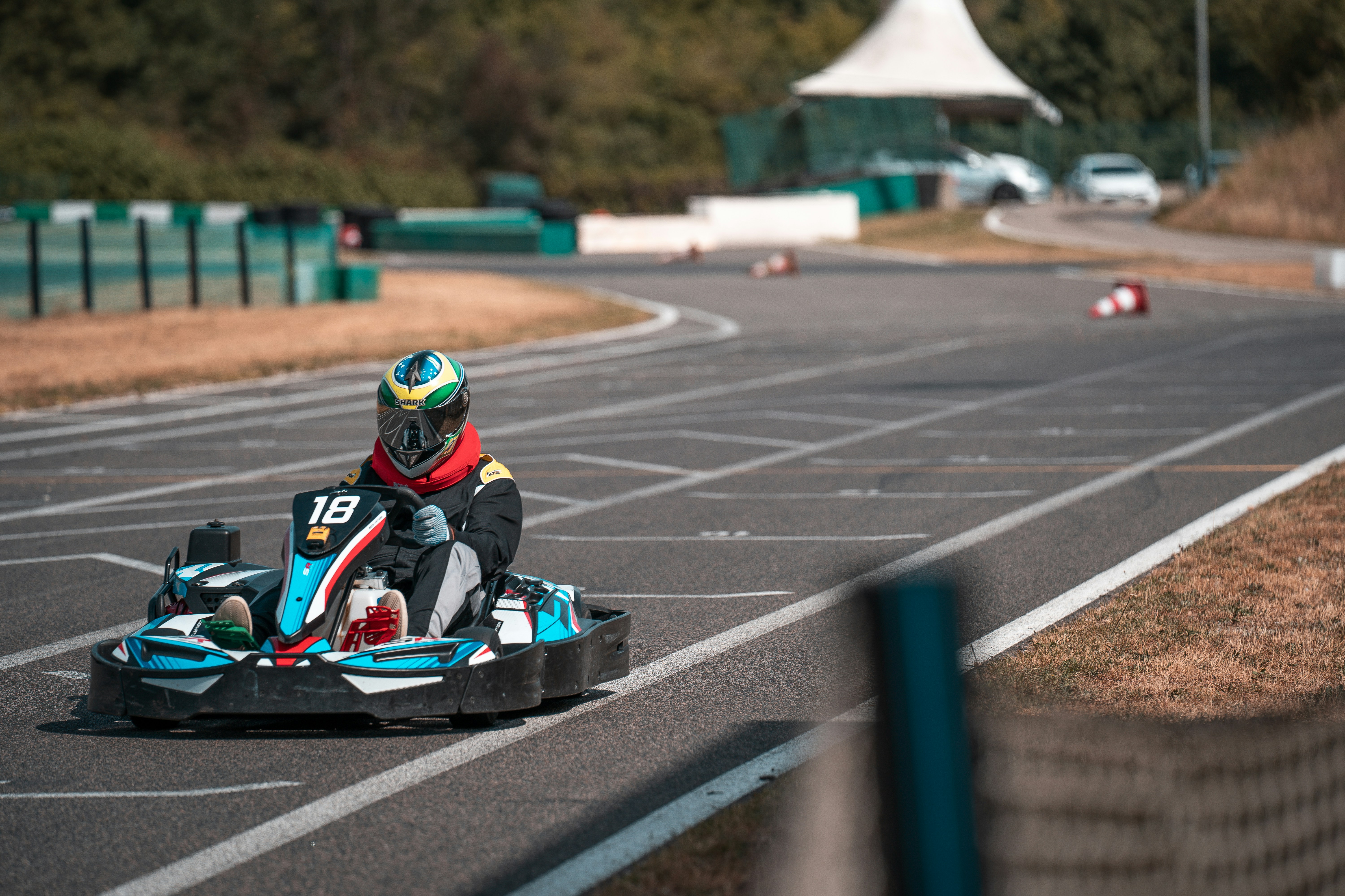 A person driving a go kart photo – Free Kart Image on Unsplash