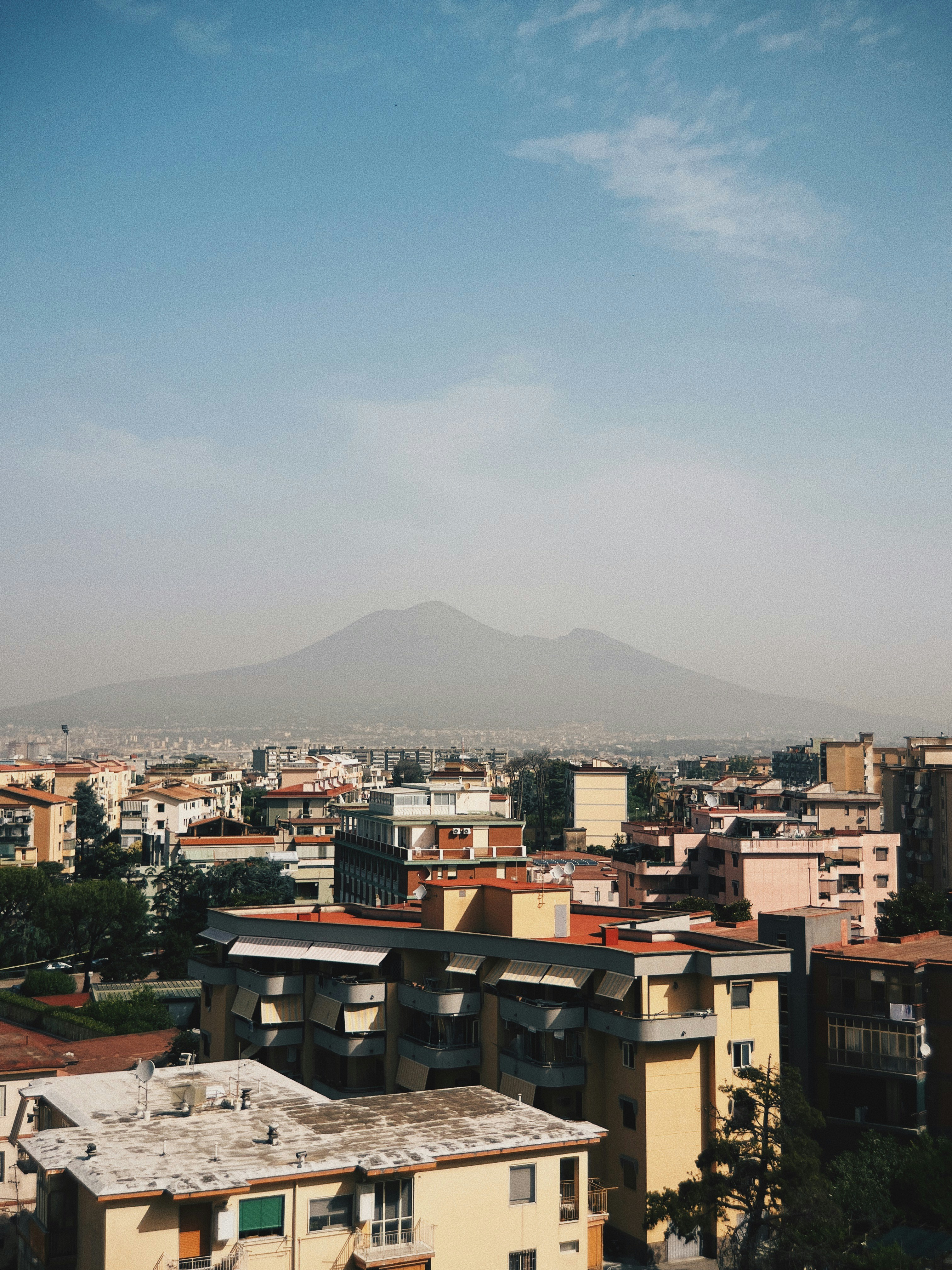 a city with a mountain in the background