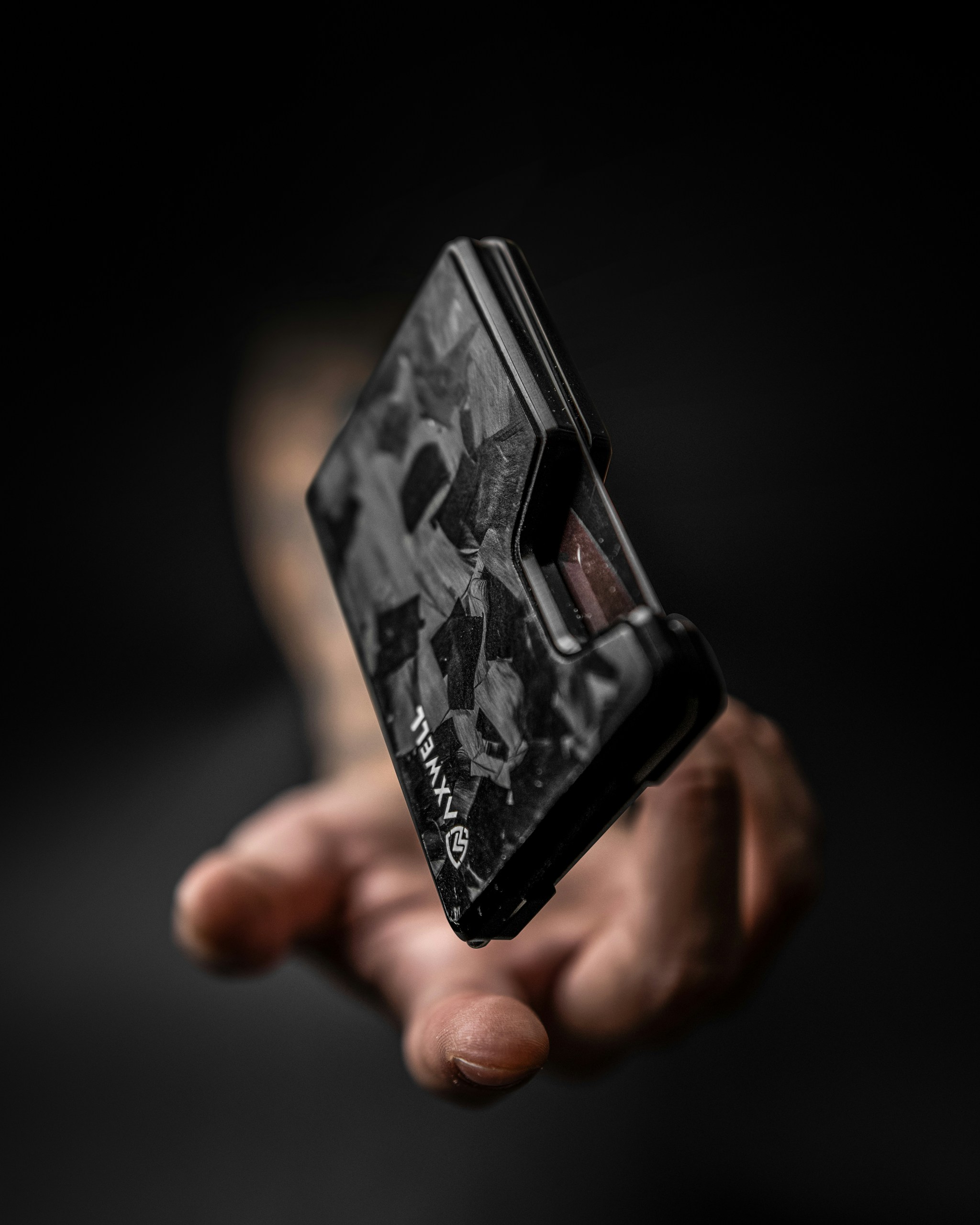 Hex Pattern Hover: A Close-Up of a Pocket Gadget