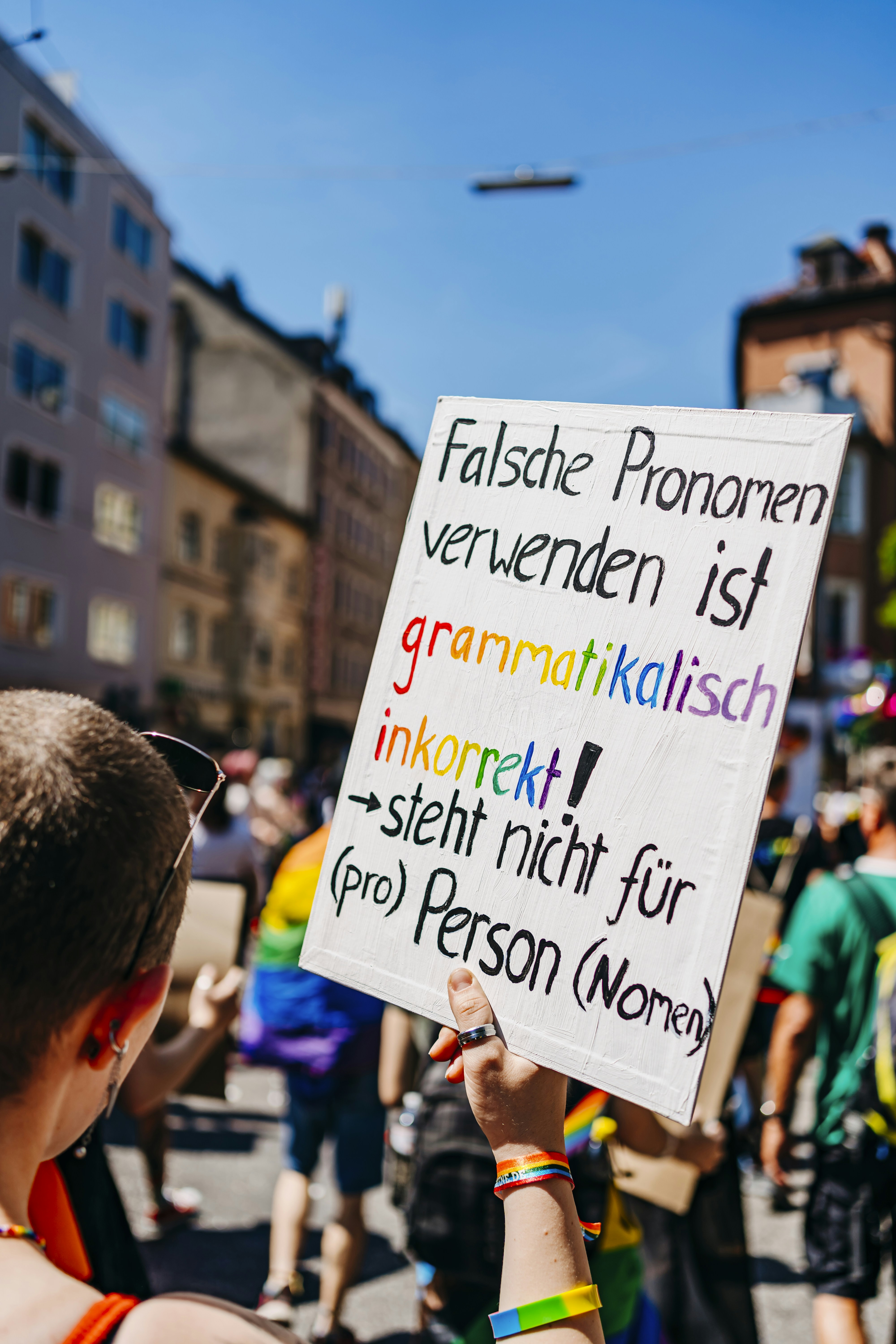 Grammar in the Crosswalk: A Street Protest Sign on Pronouns