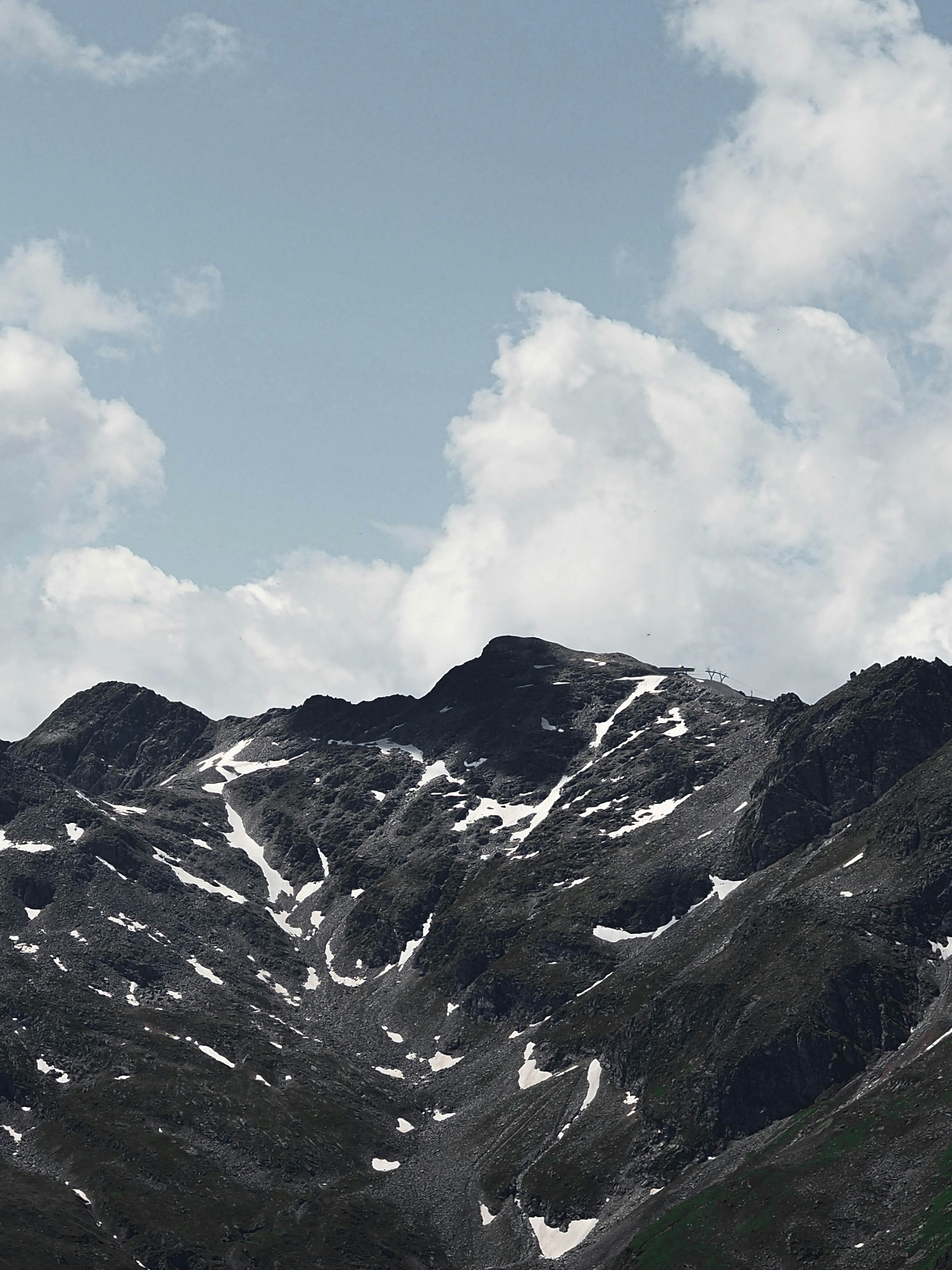 Snow-veined Ridge Beneath a Clear Alpine Sky