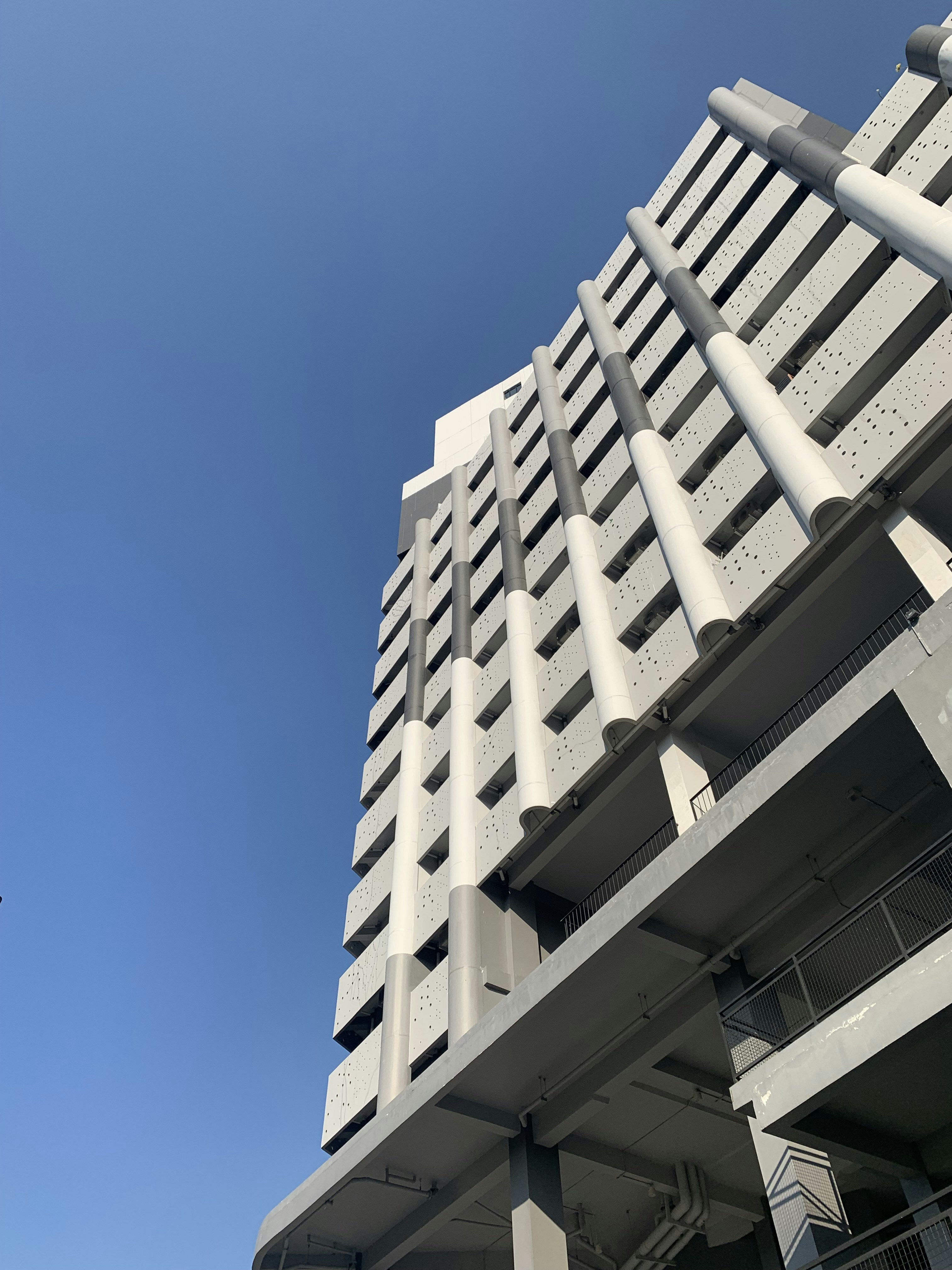 Vertical Fins Against a Clear Sky: Geometry of a Brutalist Facade