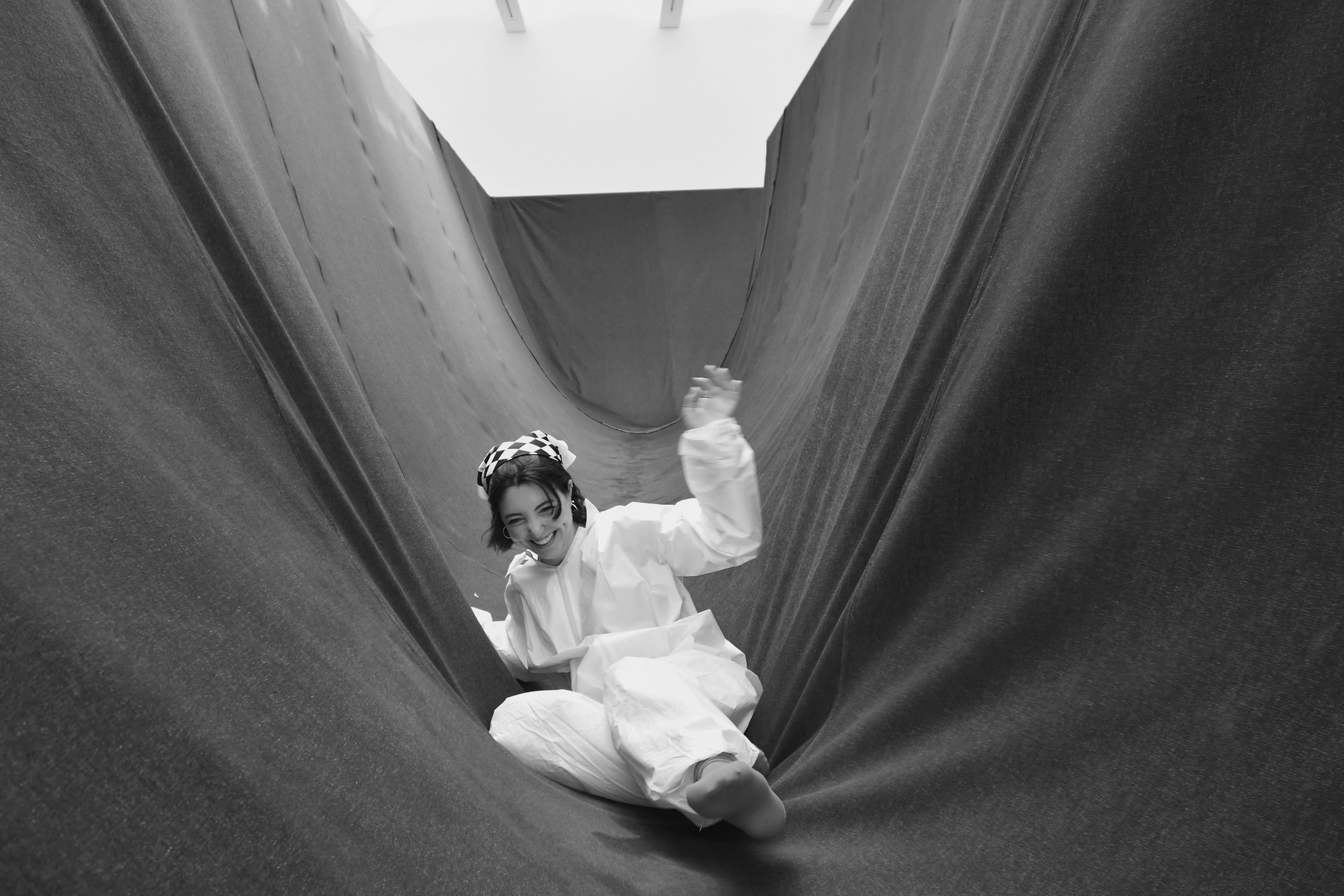 Playful Descent in a Denim Chute