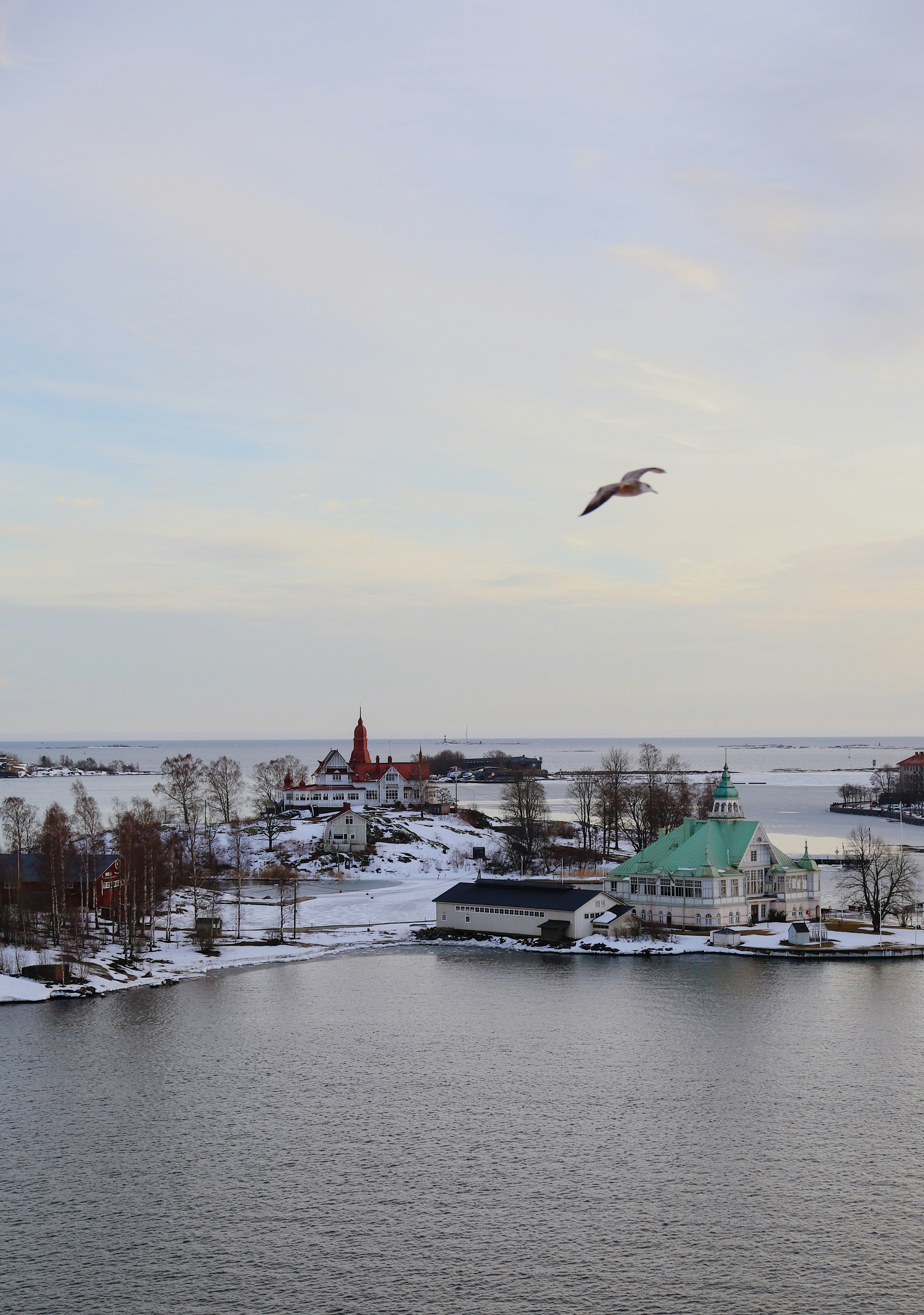 Snowbound Seascape: Winter Light Over a Nordic Village