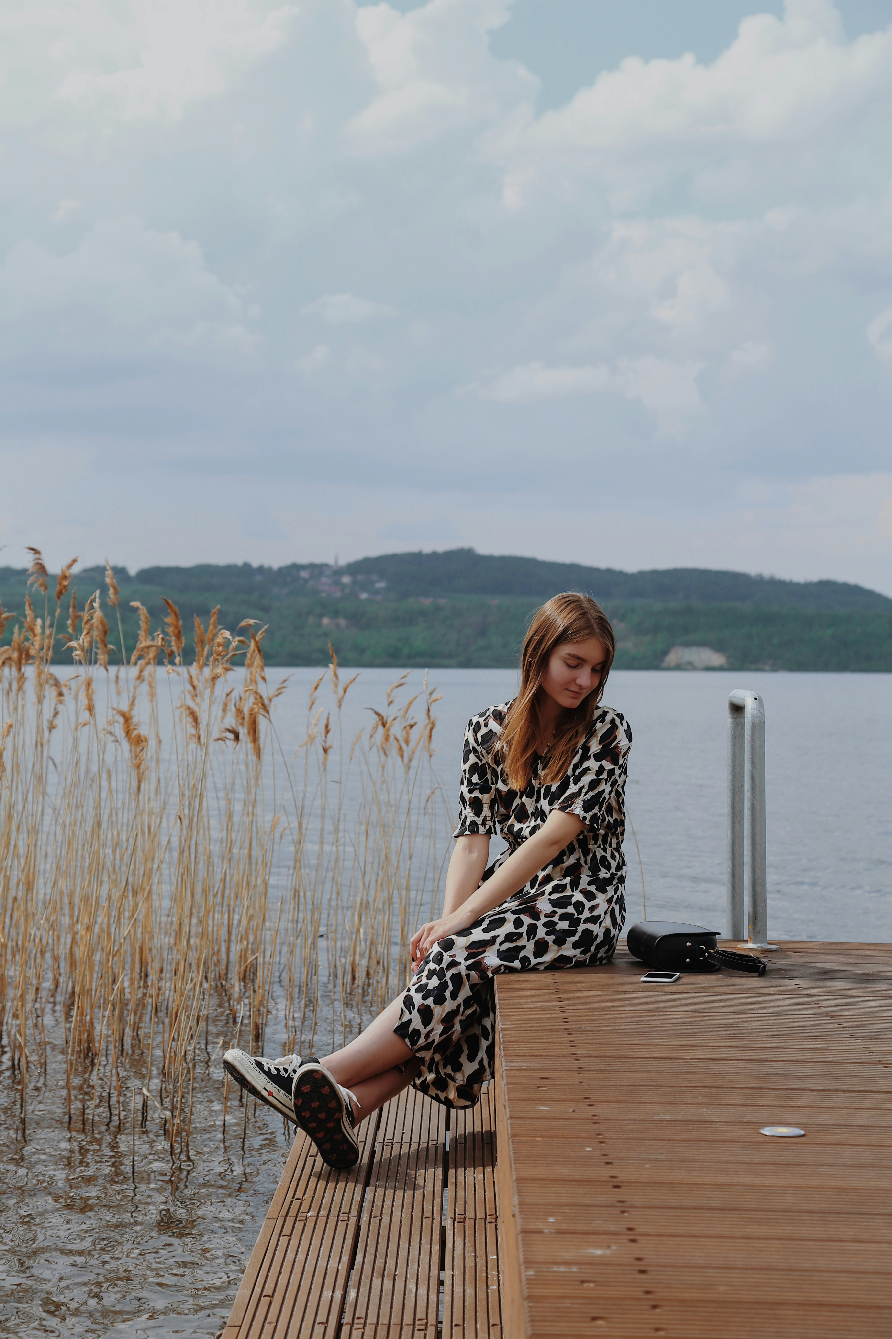 Leaning on the Dock: Quiet Moment by the Water