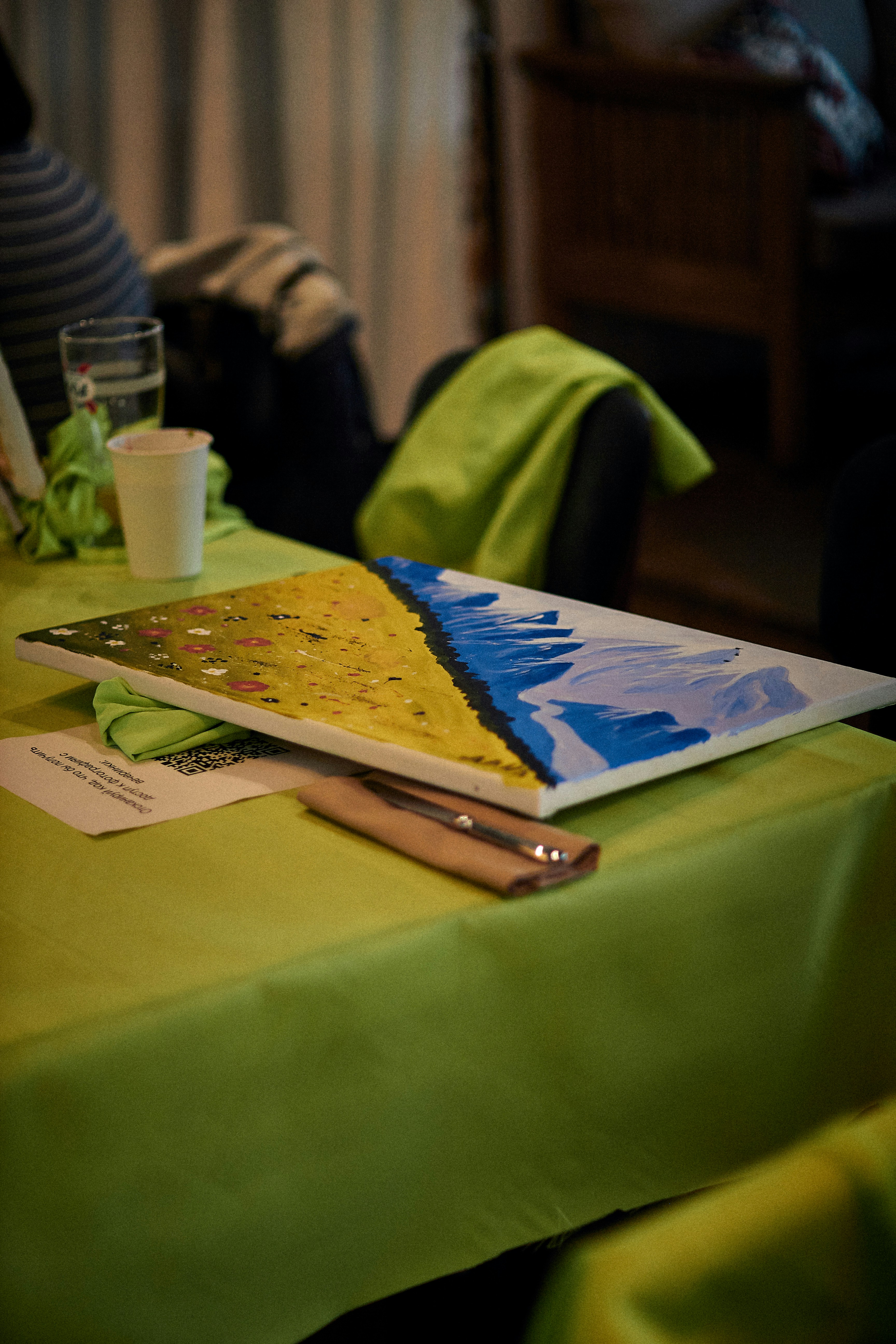 Painted Slice: A Classroom Slice of Celebration on a Green Tablecloth